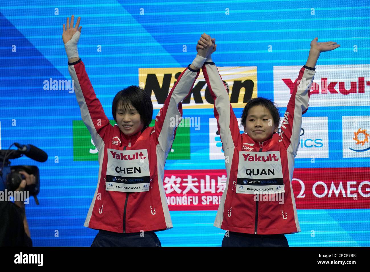 Chen Yuxi and Quan Hongchan of China celebrate after winning the women ...