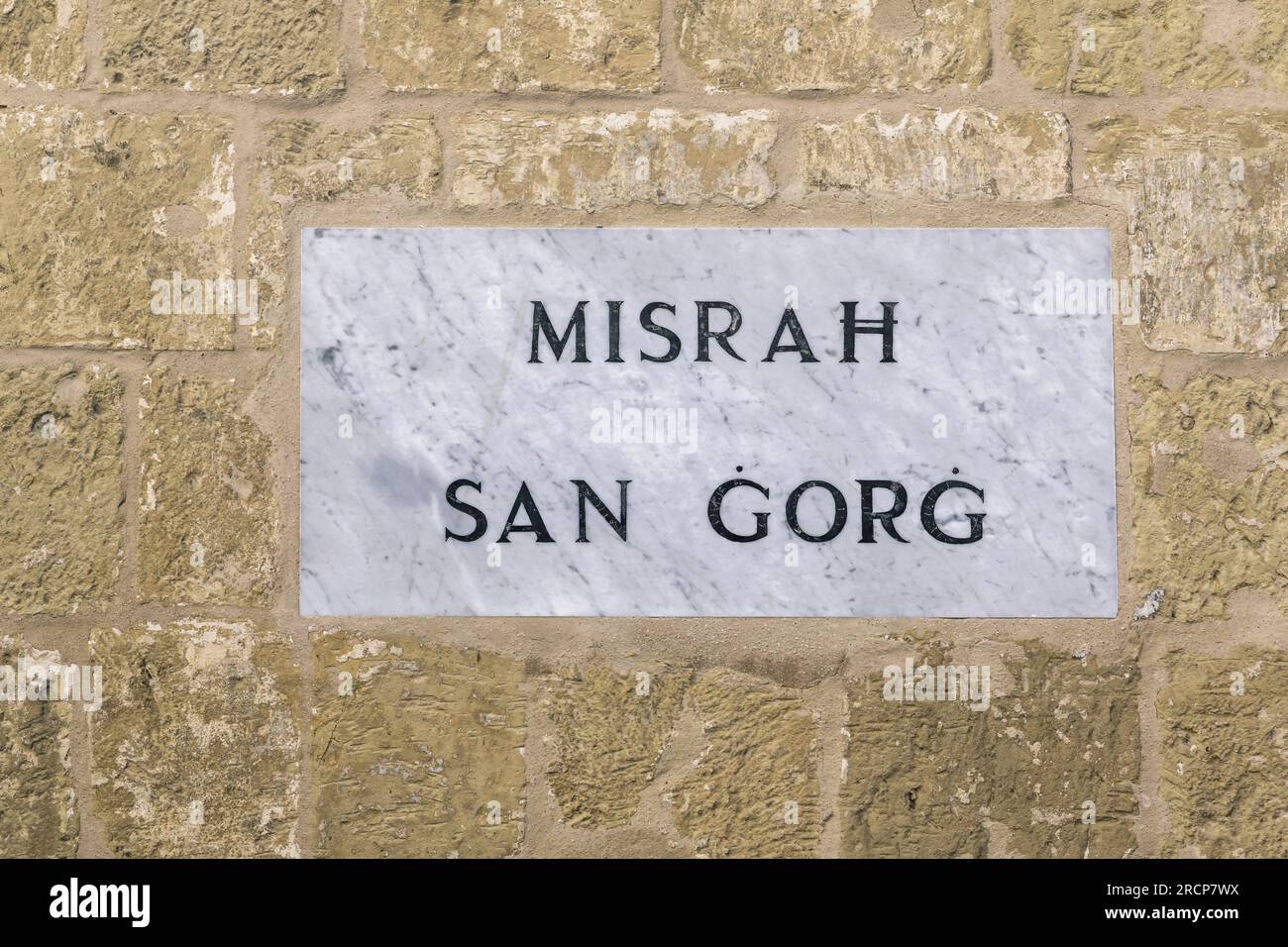 Malta, Valletta: Typical street name plaque mounted on a wall in the ...