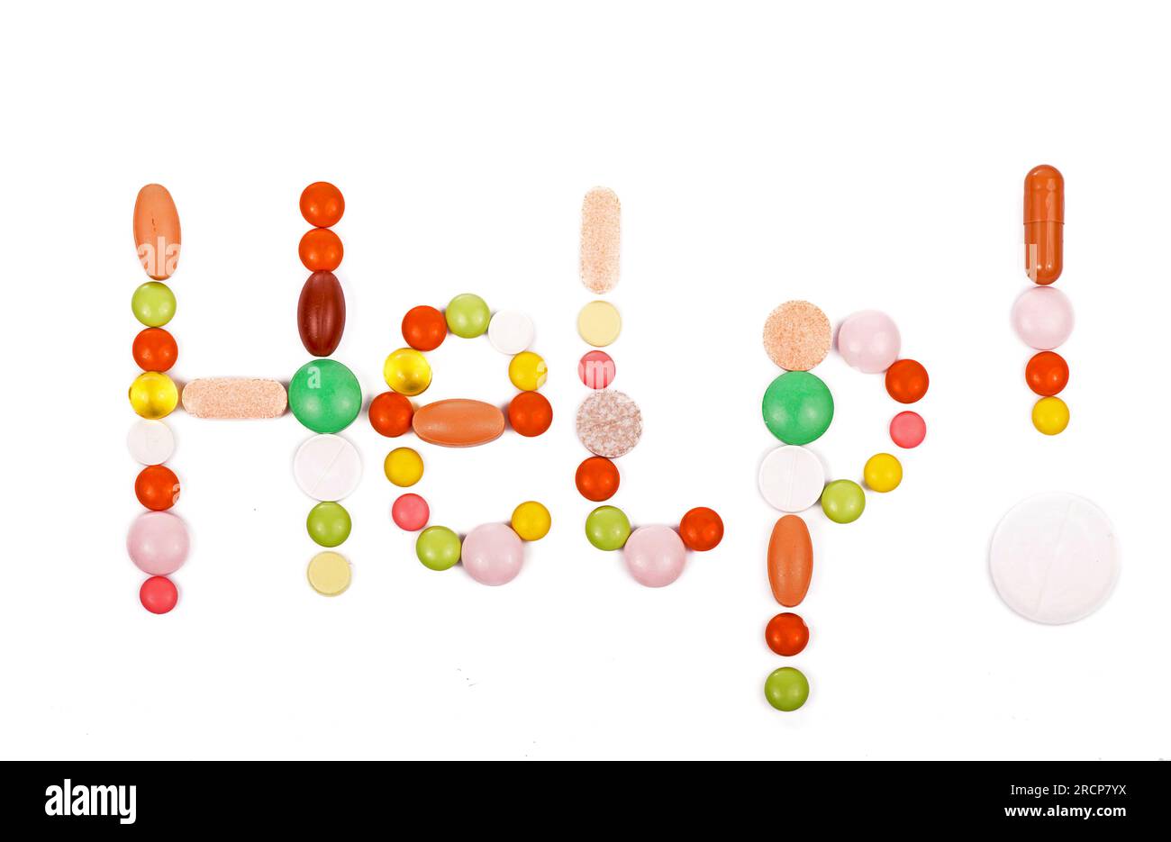 pills lined with the word Help isolated on white background Stock Photo ...