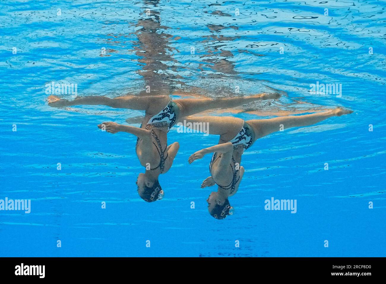 Mashiro Yasunaga and Moe Higa, of Japan, compete in the women's duet ...