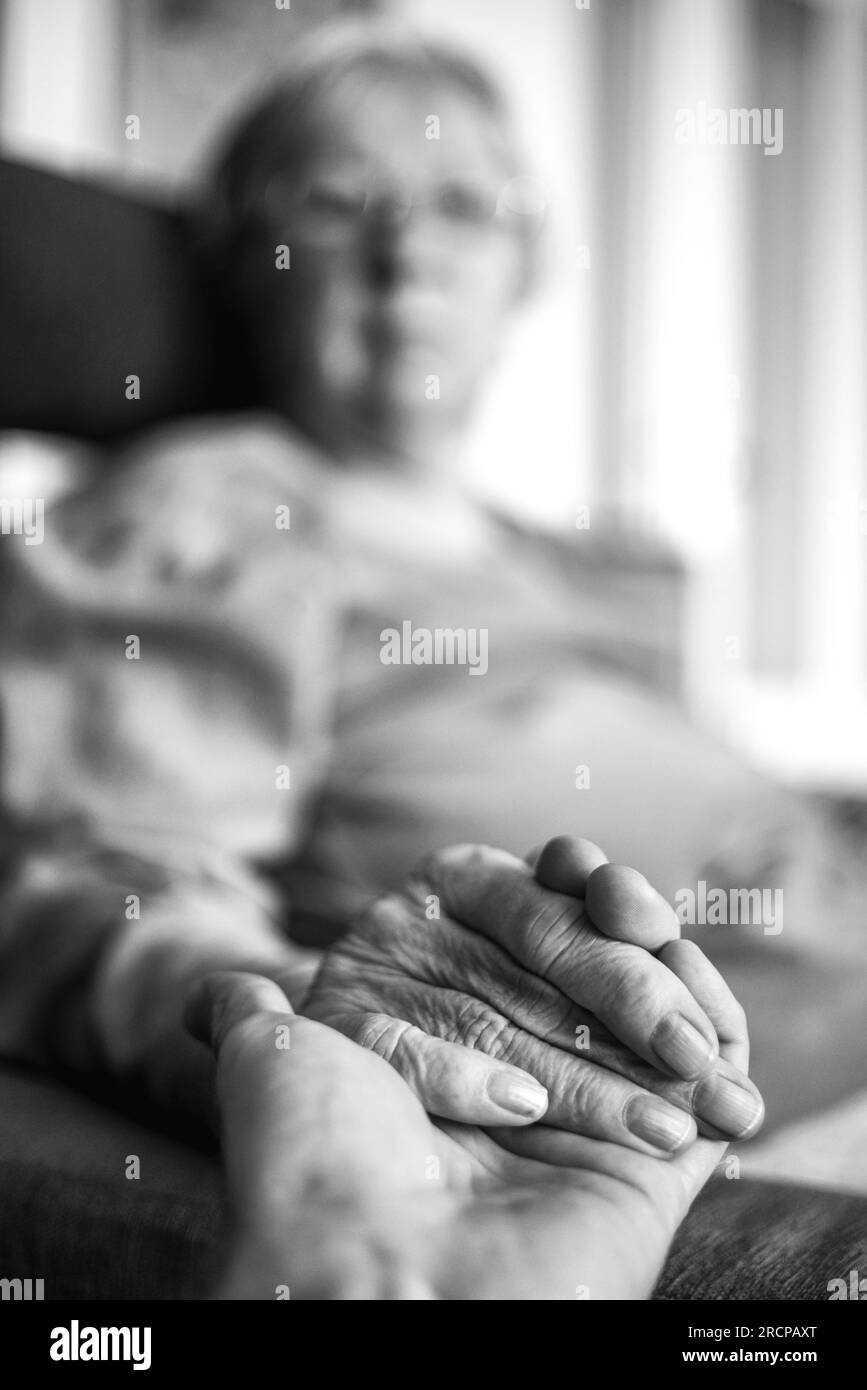 Human hand holding home Black and White Stock Photos & Images - Alamy