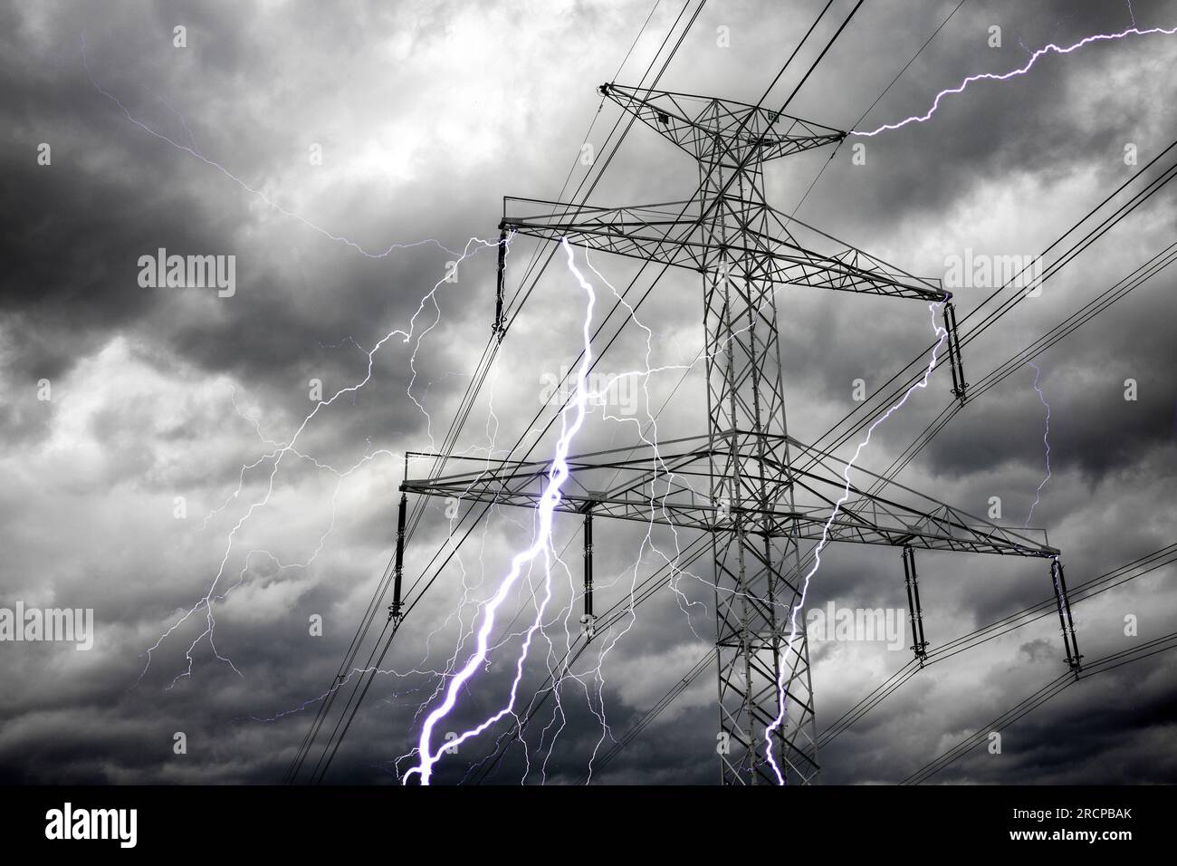 Bright lightning bolts from electric power pylon tower. Electricity ...