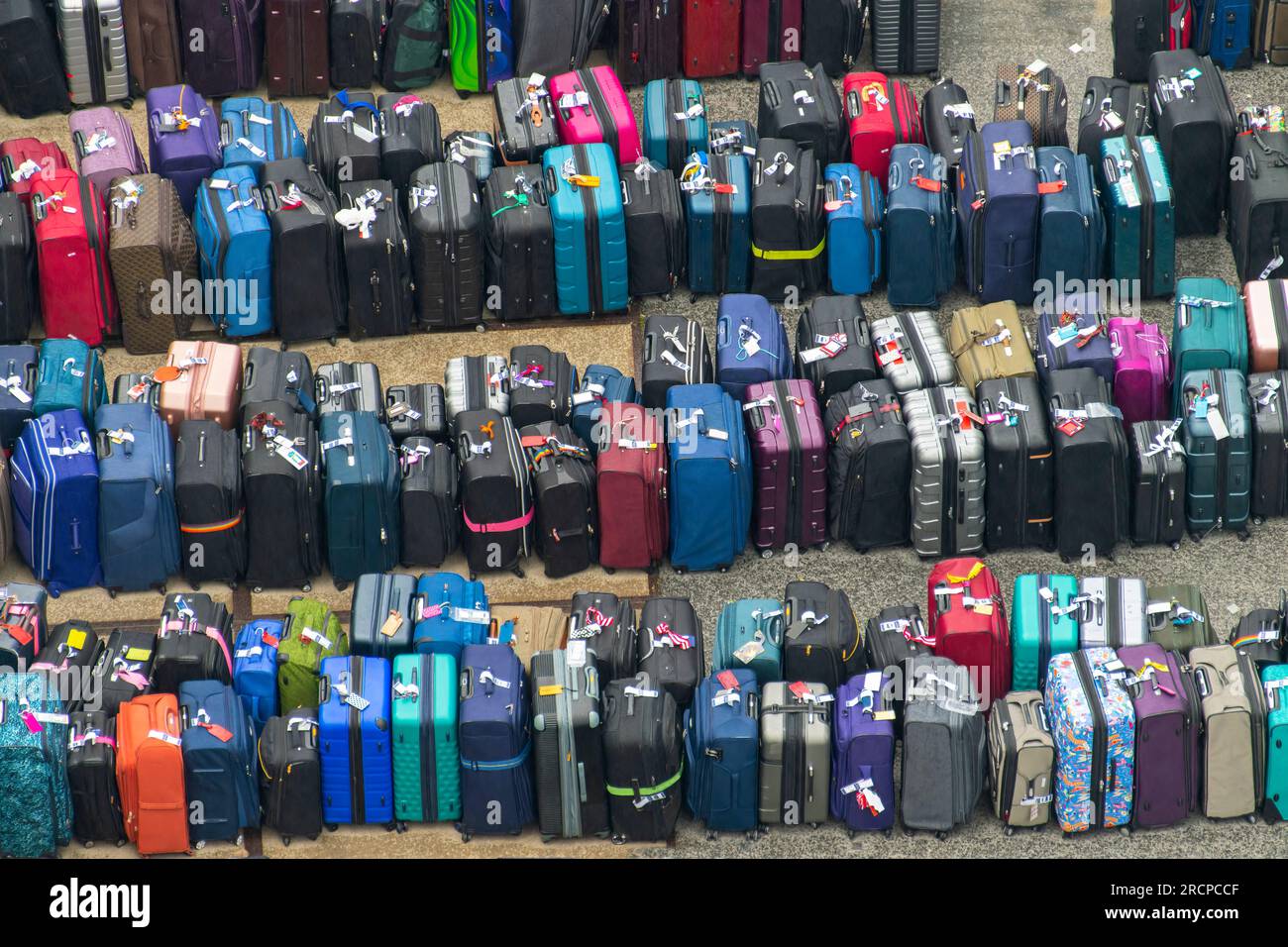 High angle view of many colorful suitcases and other luggage items all ...