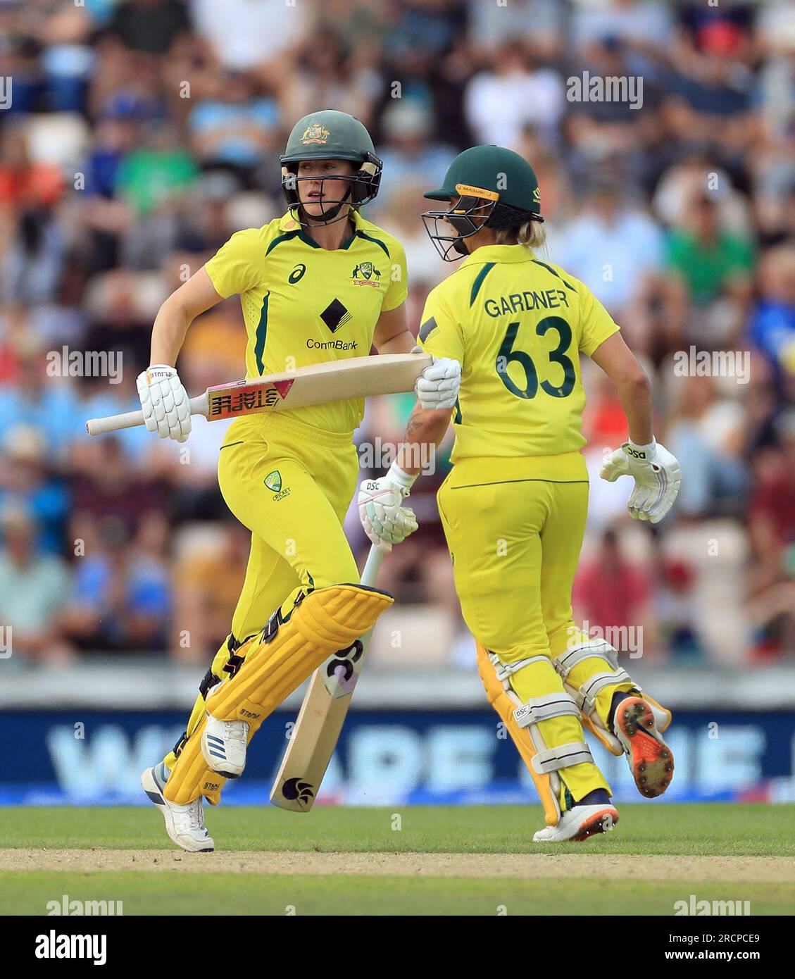 Australia's Ellyse Perry and Ashleigh Gardner run between the wickets as they bat together ...