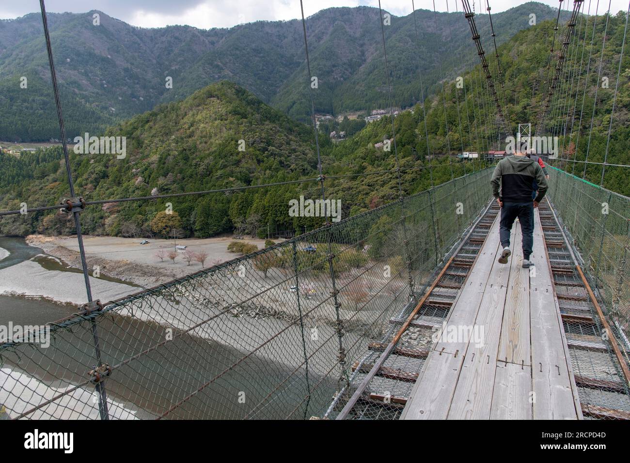 Totsukawa, Nara, Japan-April 4,2023; People walking on Tanize ...