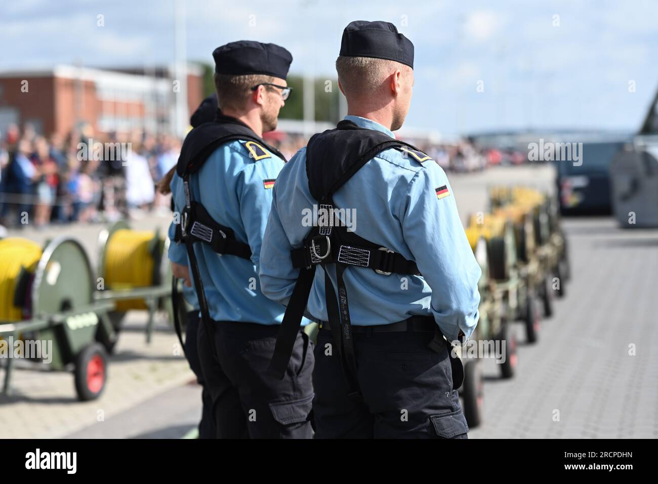 Wilhelmshaven, Germany. 16th July, 2023. Three marines wait at the pier ...