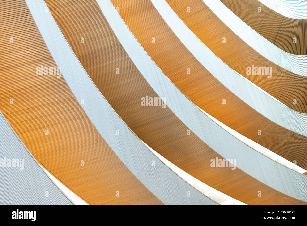 Zurich, Switzerland-May 27, 2023; Close up of the curved, wooden atrium ...