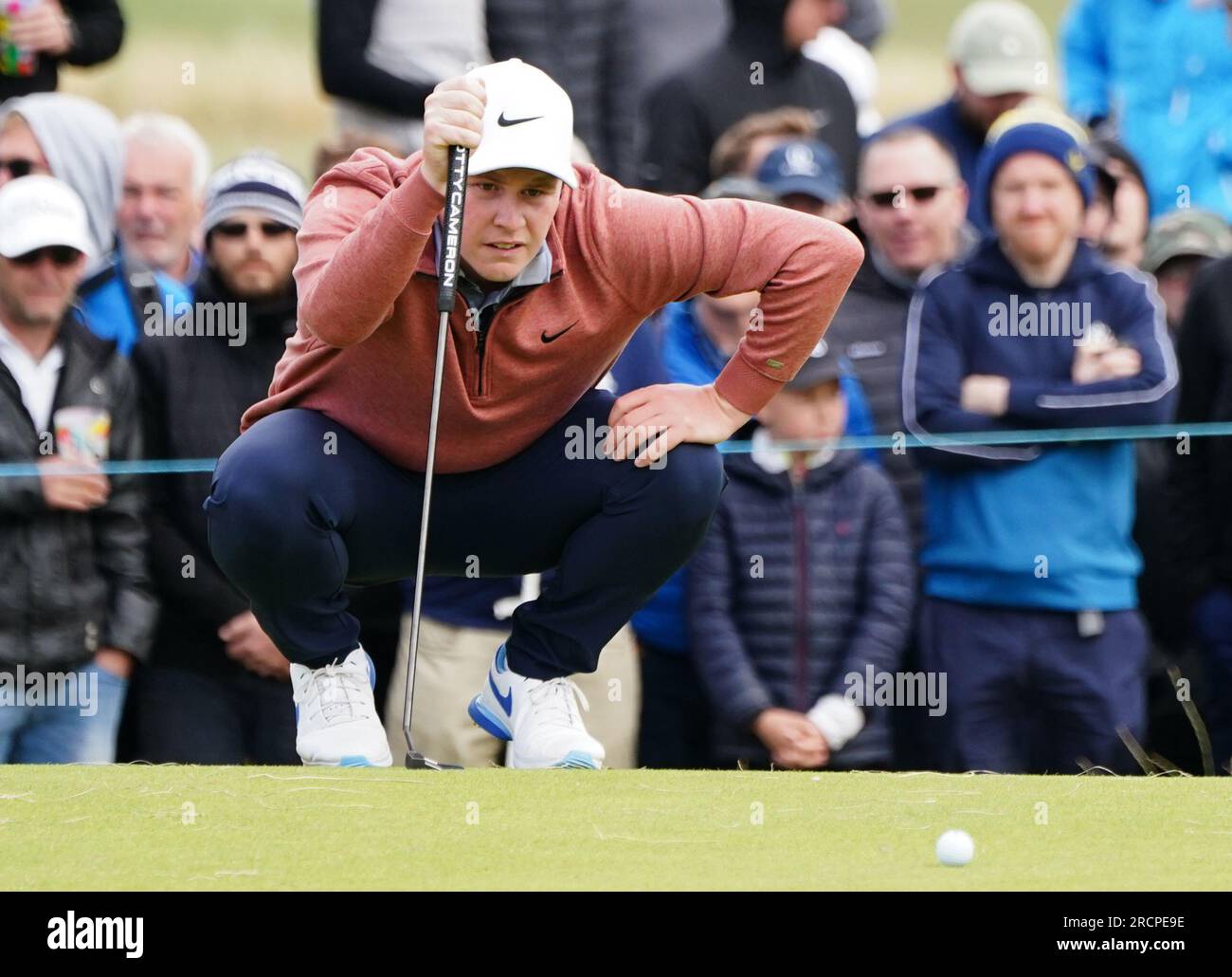 Robert MacIntyre lines up a putt on the 17th green on day four of the ...
