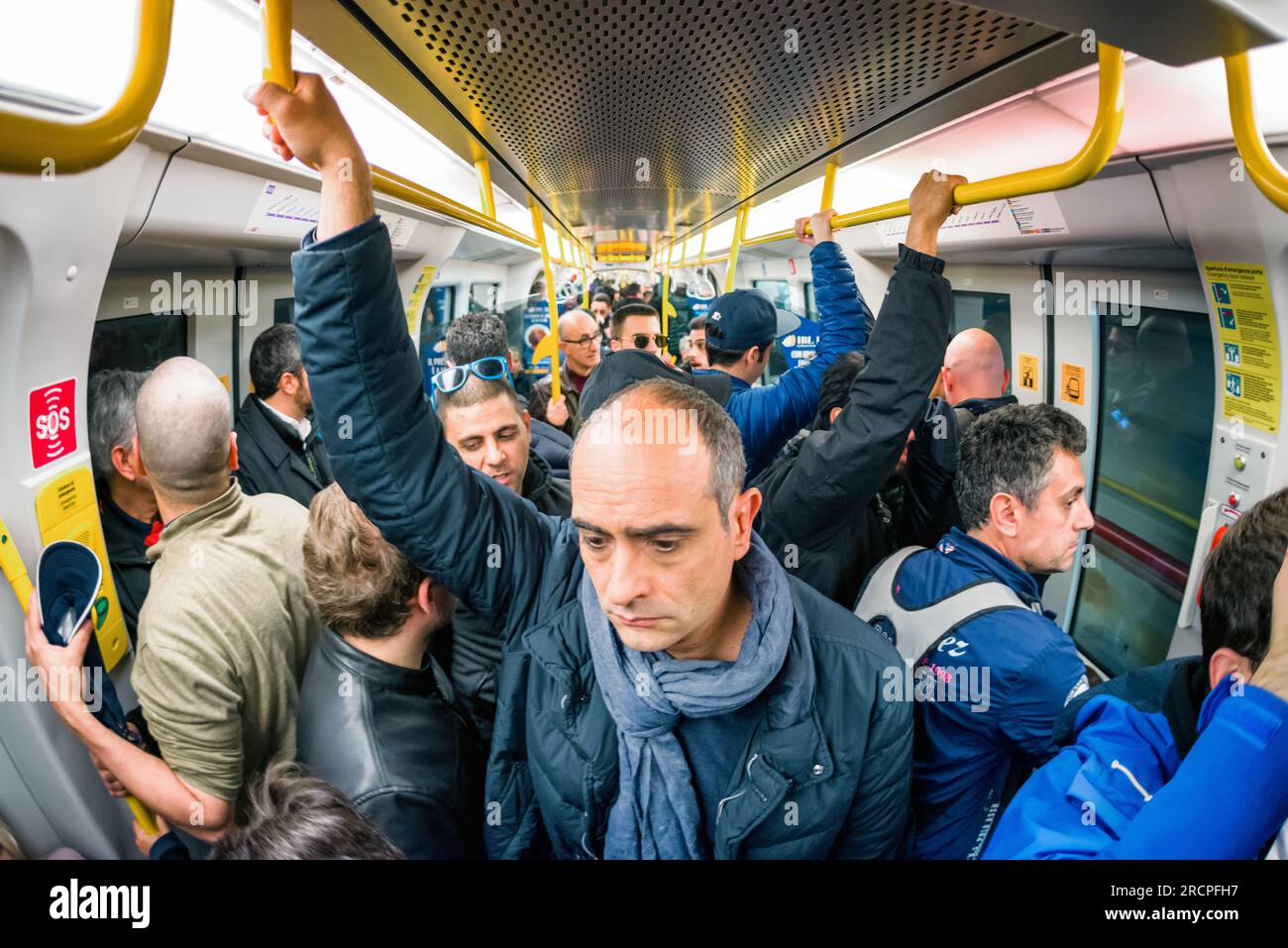 Overcrowded tube train hi-res stock photography and images - Alamy