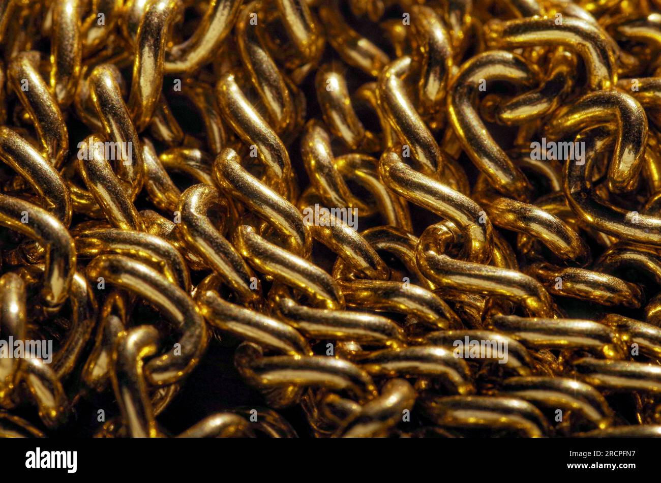 Golden metal chain links hi-res stock photography and images - Alamy