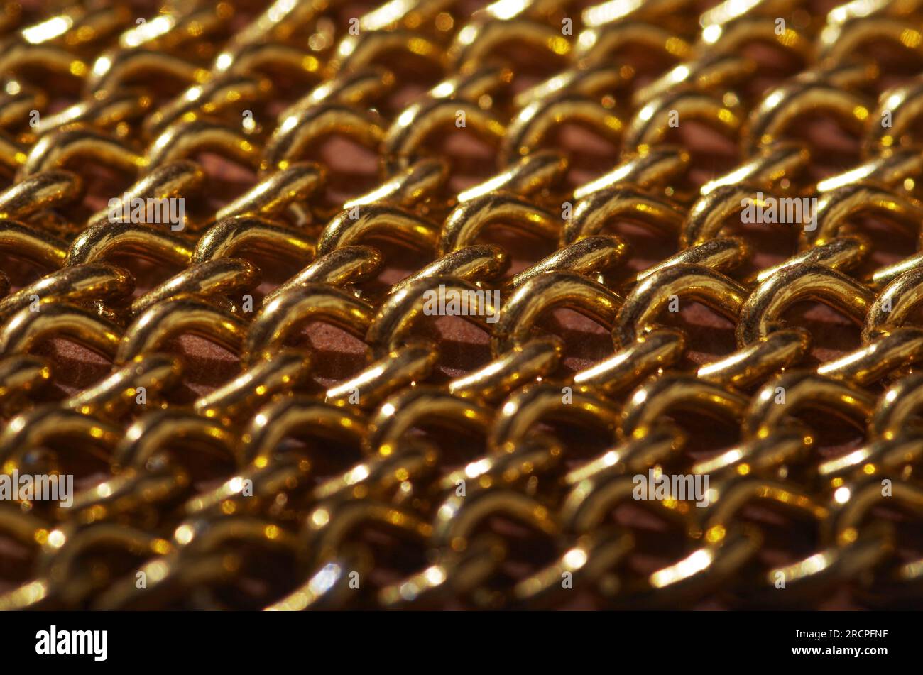 Golden metal chain links hi-res stock photography and images - Alamy