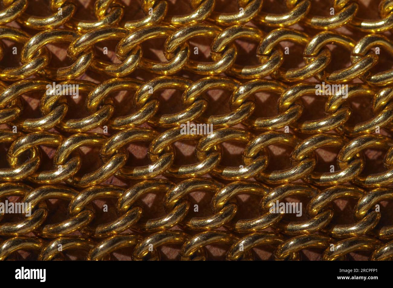 Golden metal chain links hi-res stock photography and images - Alamy