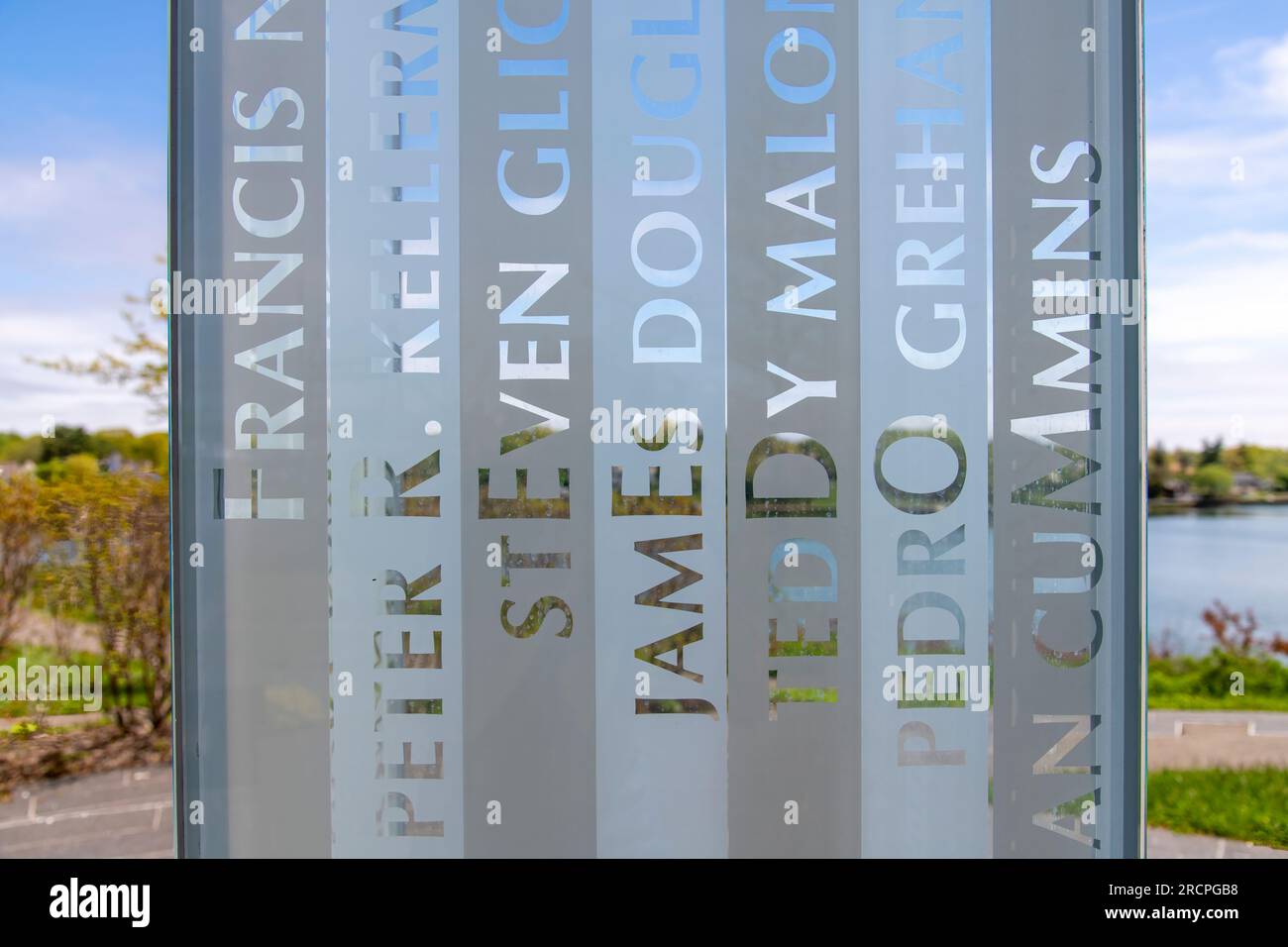 Greenwich, CT, USA-May 2022; Close up view of engraved names in glass ...