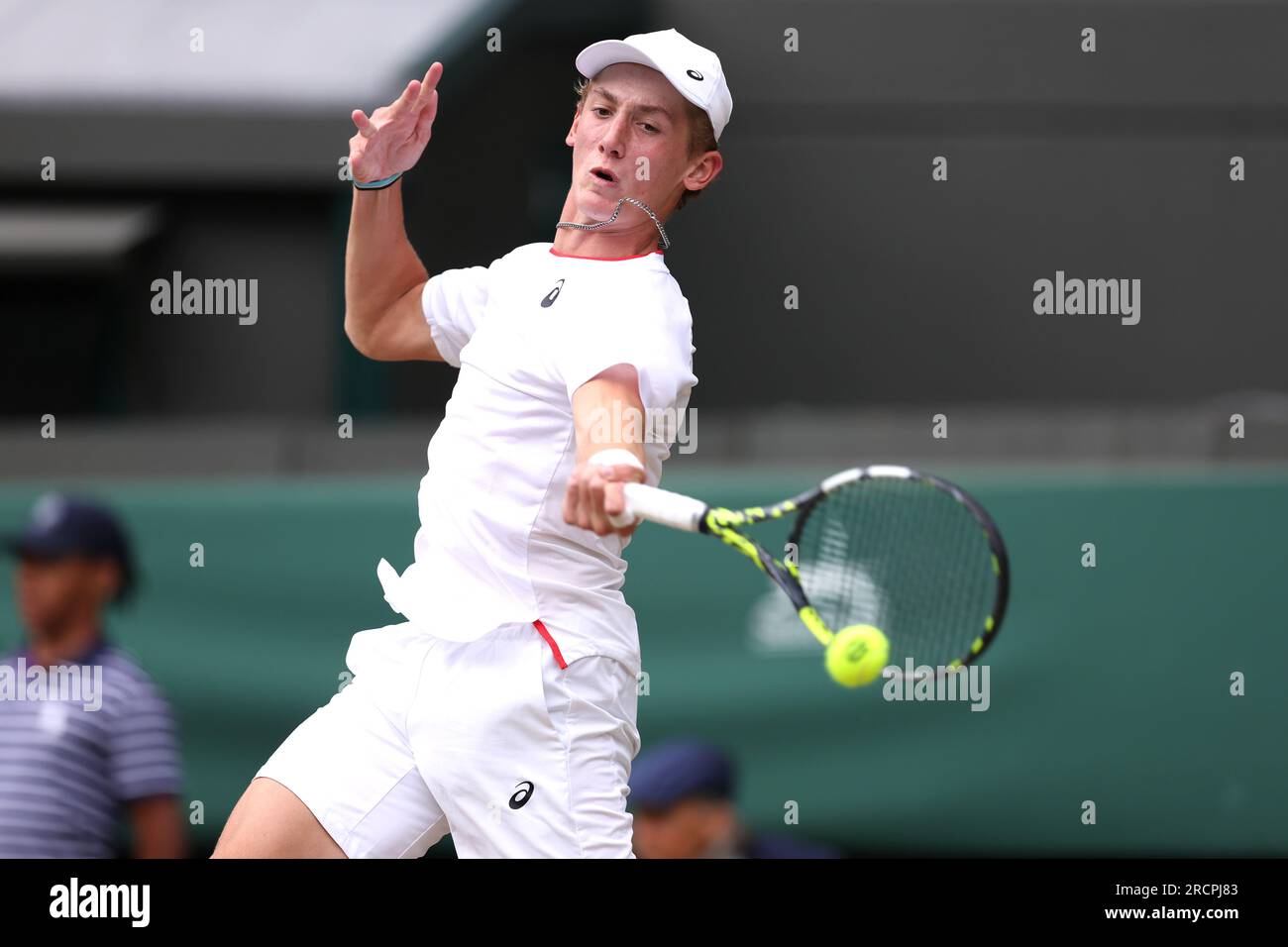Henry Searle in action against Yaroslav Demin during the Boys' Singles ...