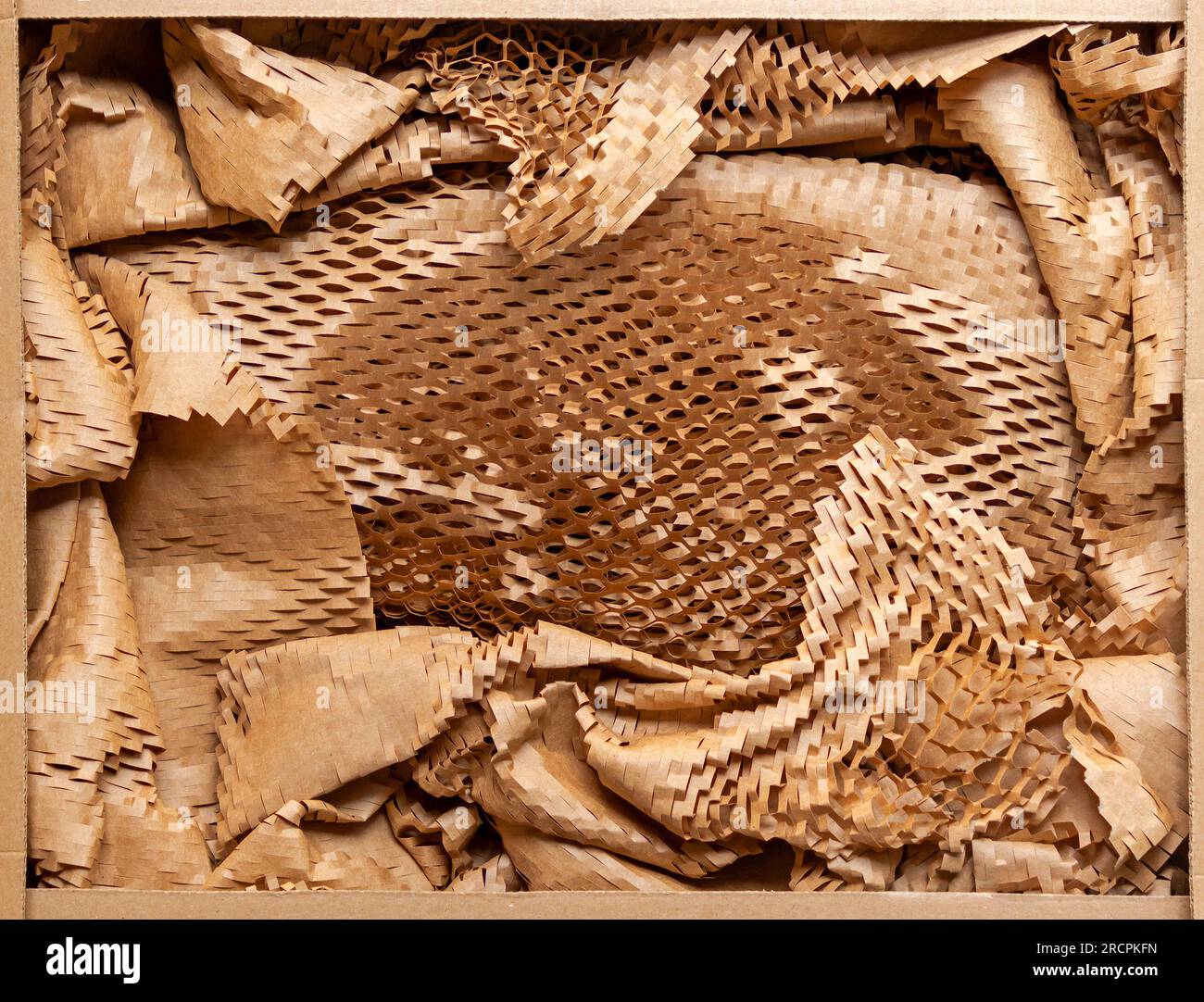 Cardboard box with protection papers used to save fragile products ...