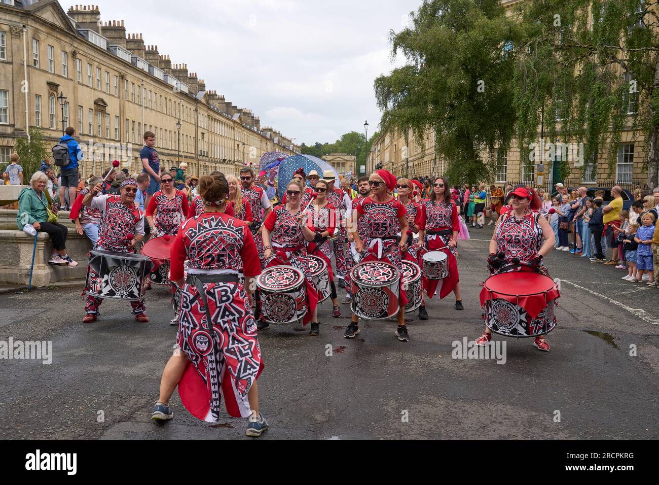 Music and dance group parade in ornate costumes at the annual carnival ...