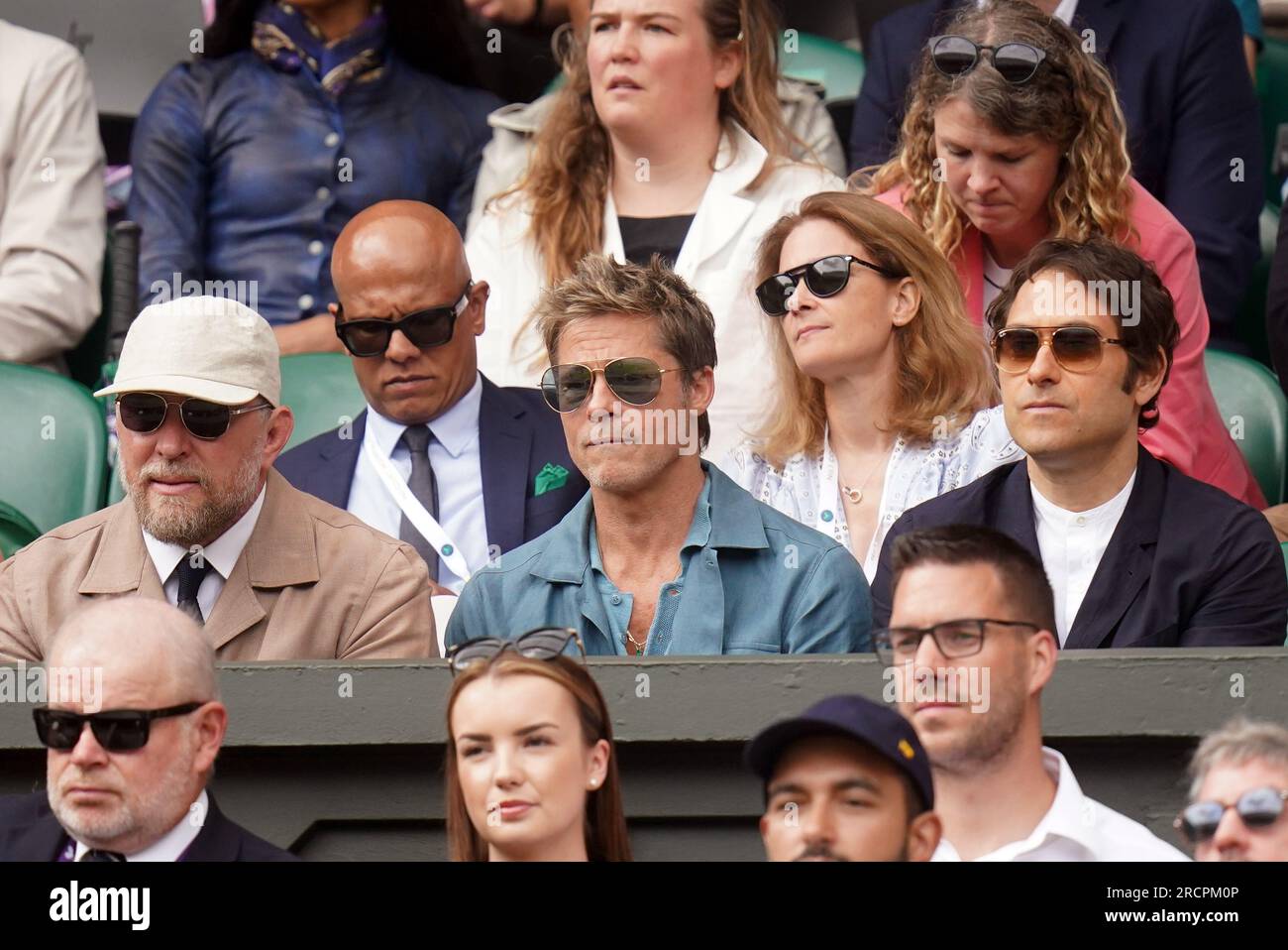 Brad Pitt (centre) and Guy Ritchie (left) watching the Gentlemen's ...