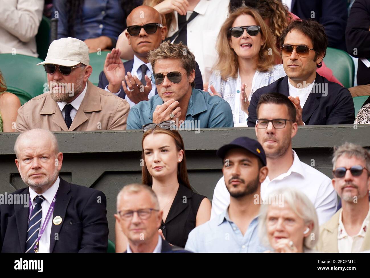 Brad Pitt (centre) and Guy Ritchie (left) watching the Gentlemen's ...