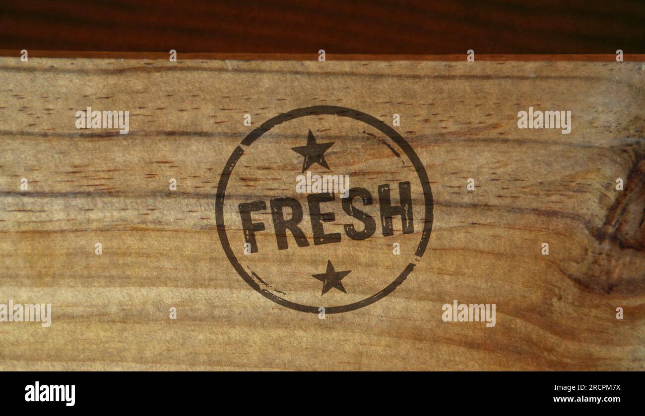 Fresh stamp printed on wooden box. Eco natural and organic product ...