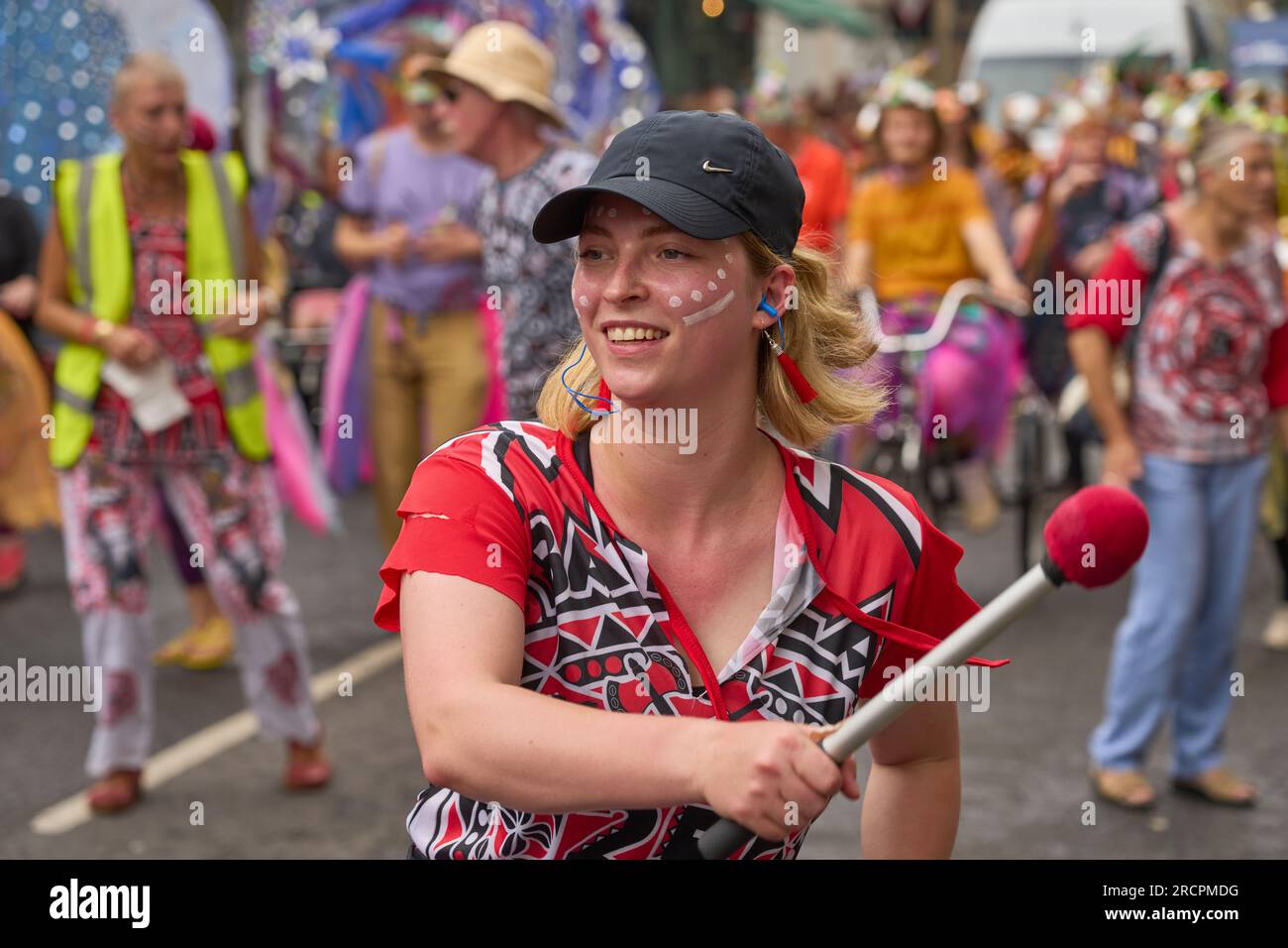 Music and dance group parade in ornate costumes at the annual carnival ...