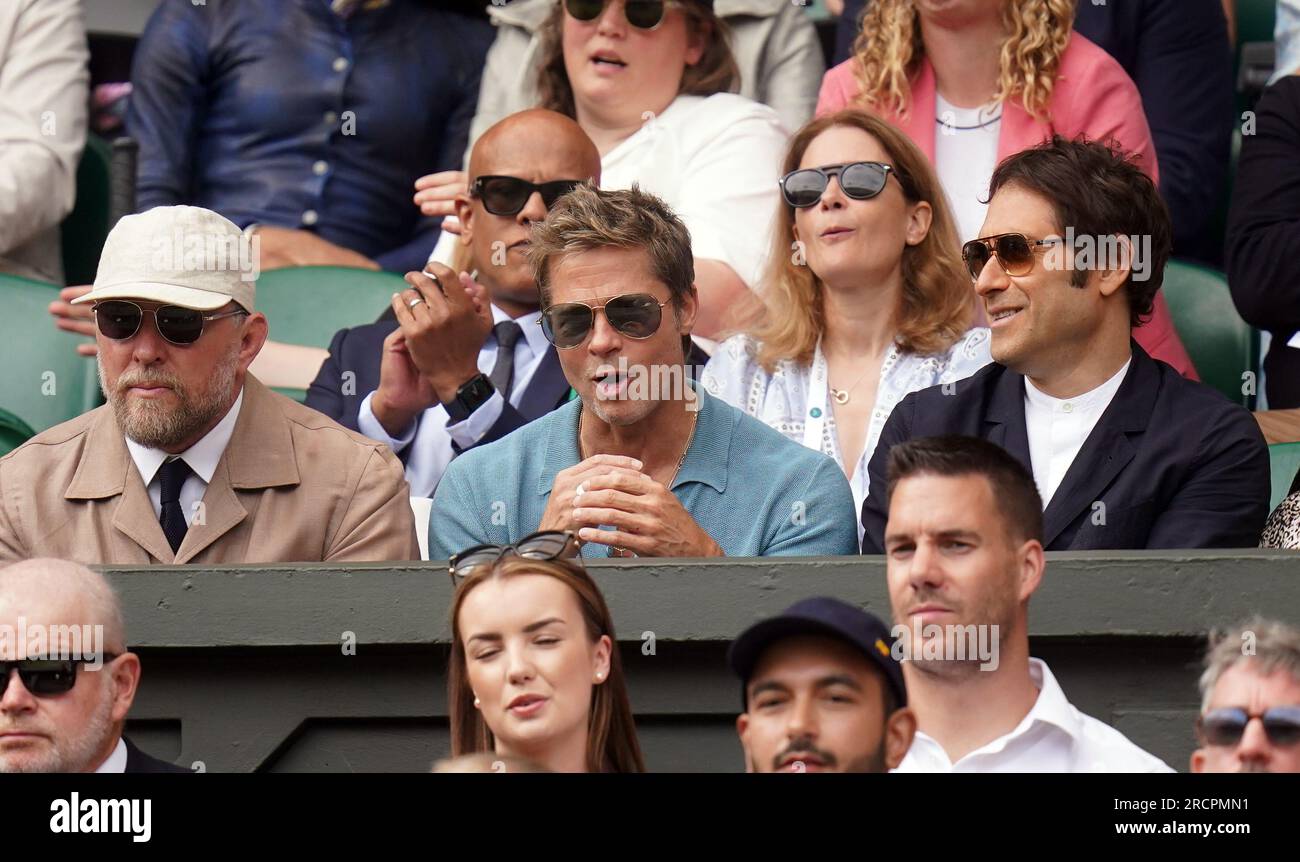 Guy Ritchie (left), Brad Pitt and Jeremy Kleiner (right) watching the ...