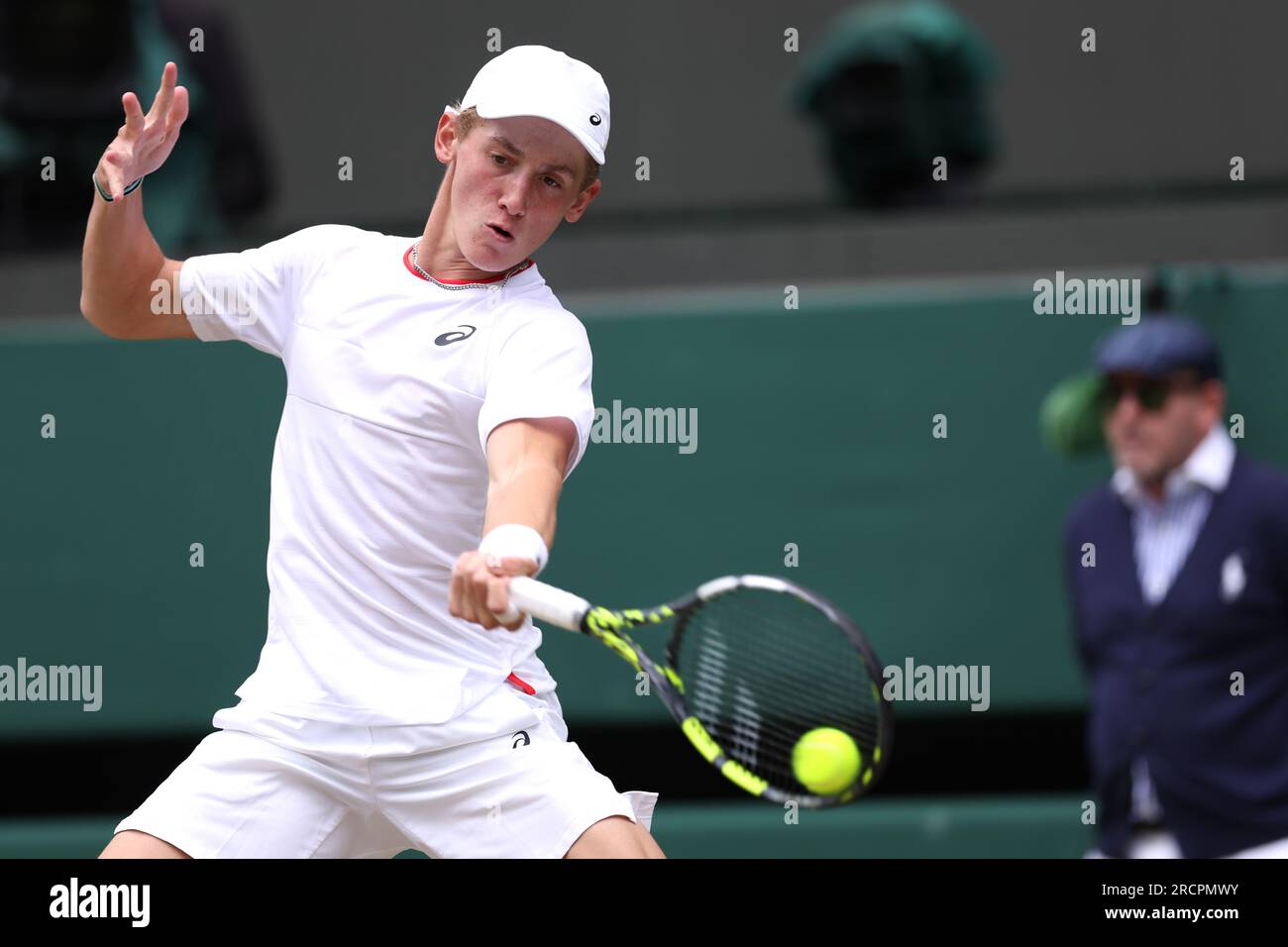 Henry Searle in action against Yaroslav Demin during the Boys' Singles ...