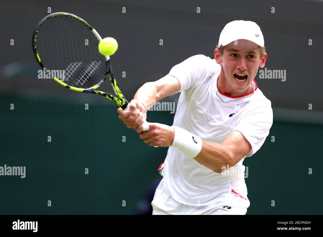 Henry Searle in action against Yaroslav Demin during the Boys' Singles ...