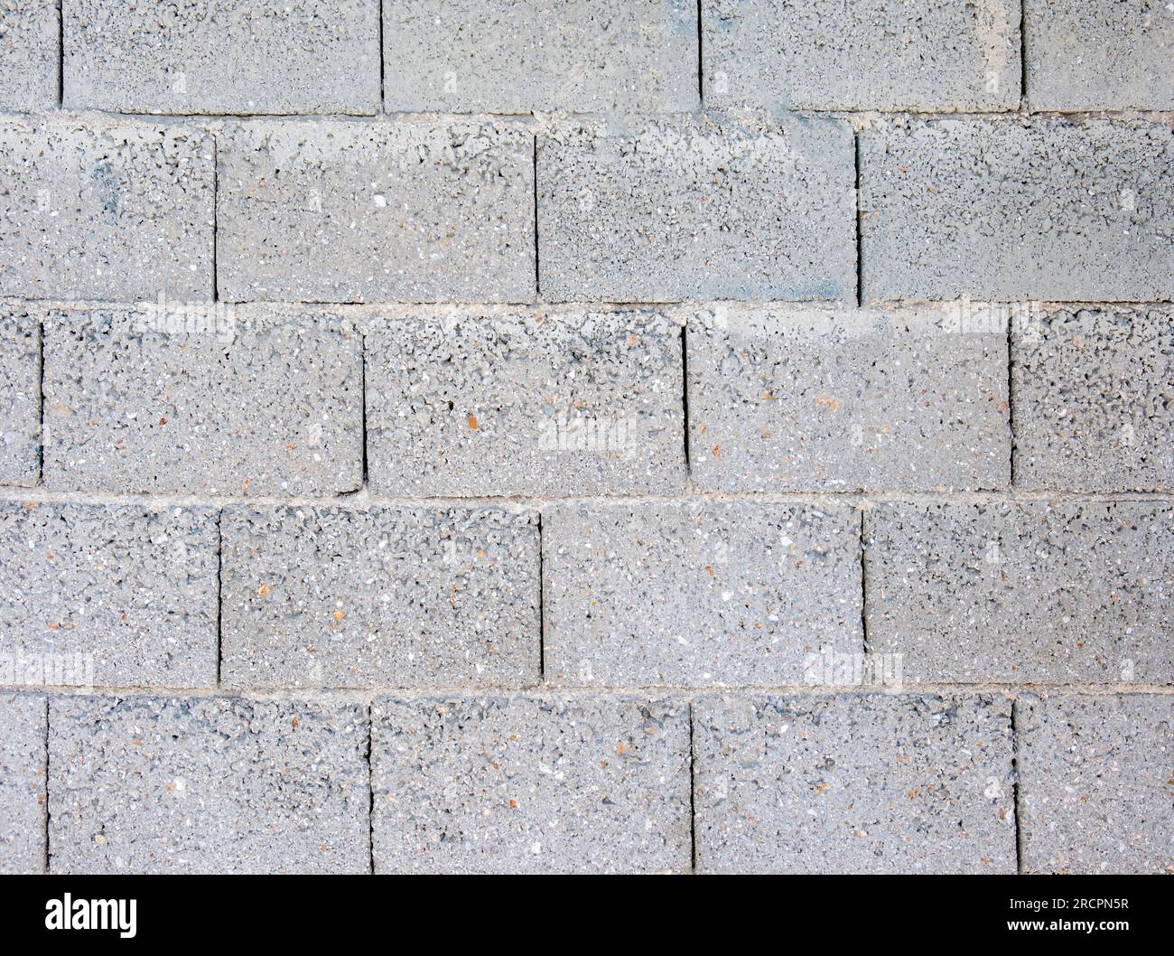 Concrete block empty wall background texture, grey color cement in rectangular geometric shape ...