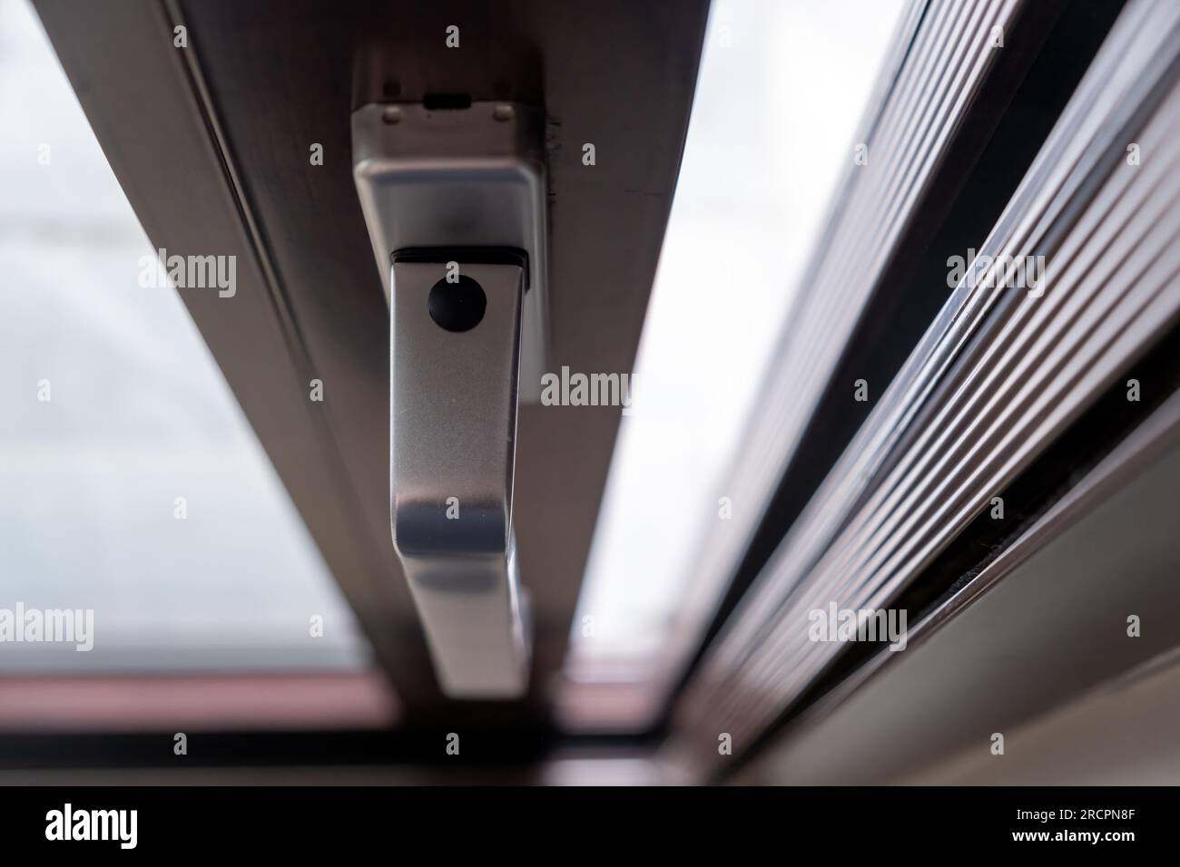 Aluminum silver handle on close window with blocking system with blur ...