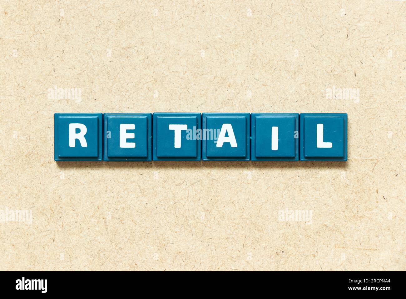 Tile alphabet letter in word retail on wood background Stock Photo - Alamy