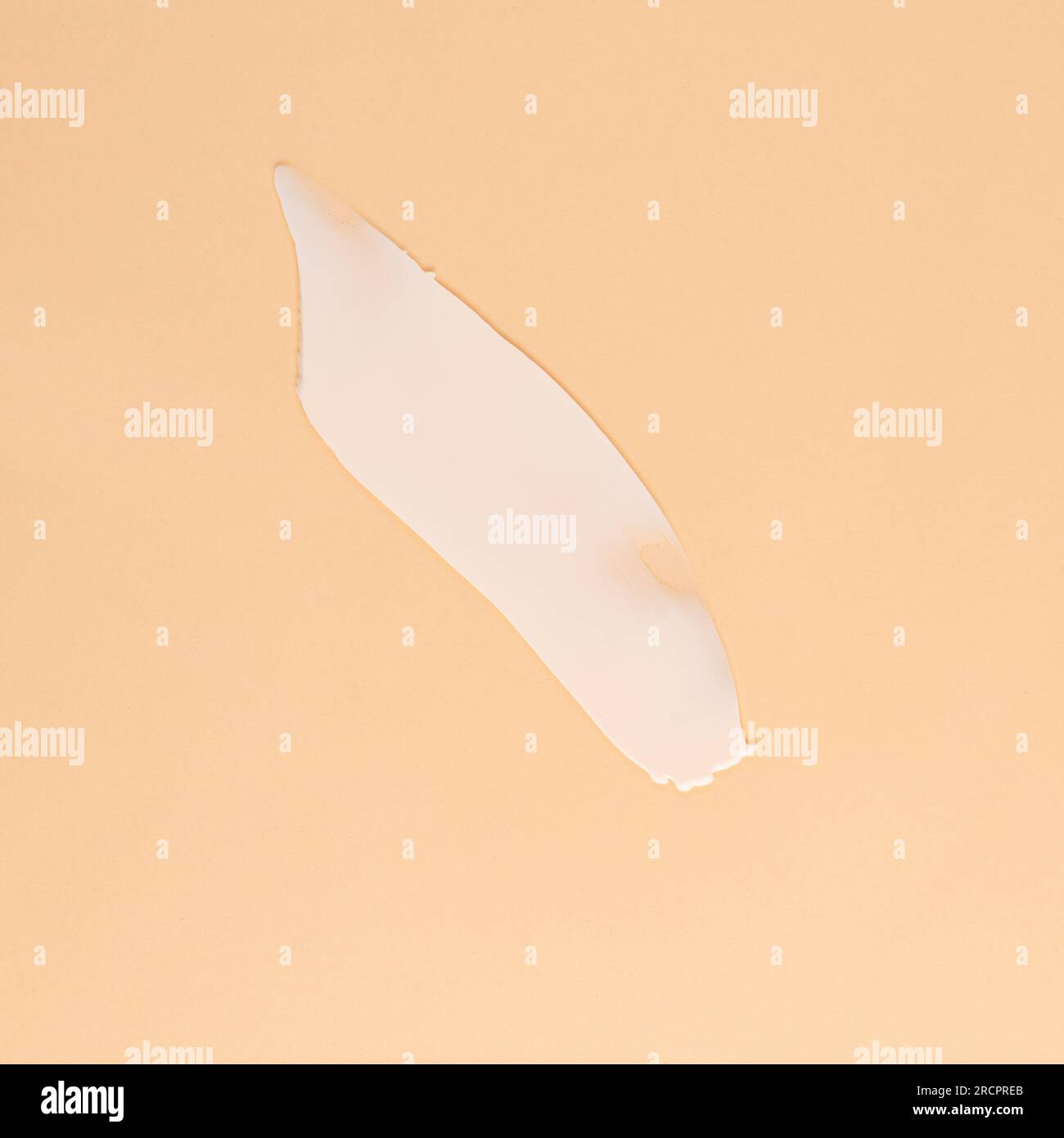 Smear of white cream for face and body on a brown background Stock ...