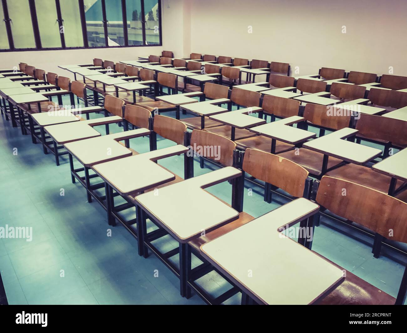 Wooden chairs in the classroom background Stock Photo - Alamy