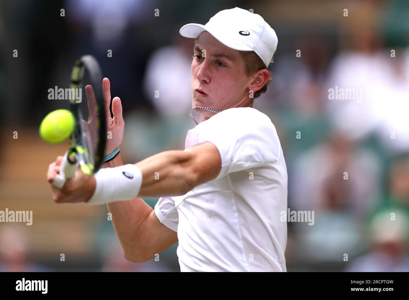 Henry Searle in action against Yaroslav Demin during the Boys' Singles ...