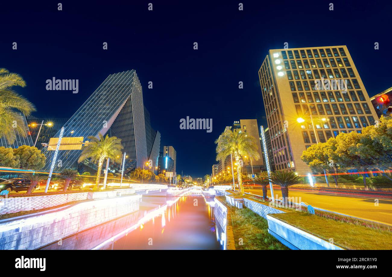 Modern city skyline, Ninbo, China at night Stock Photo - Alamy
