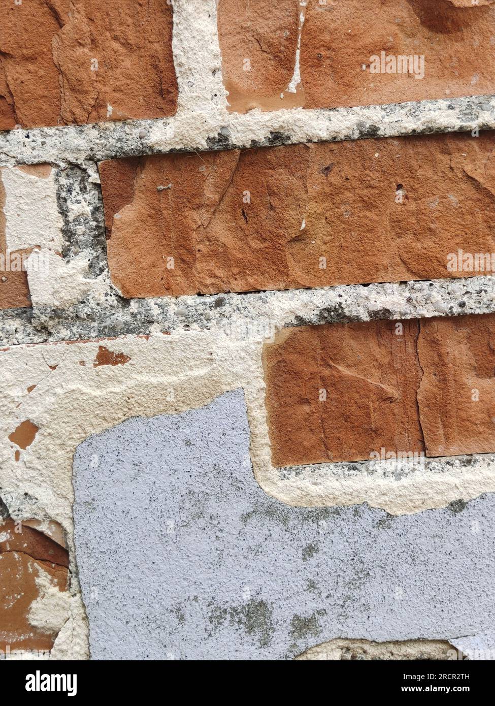 Brick wall forming a background Stock Photo - Alamy