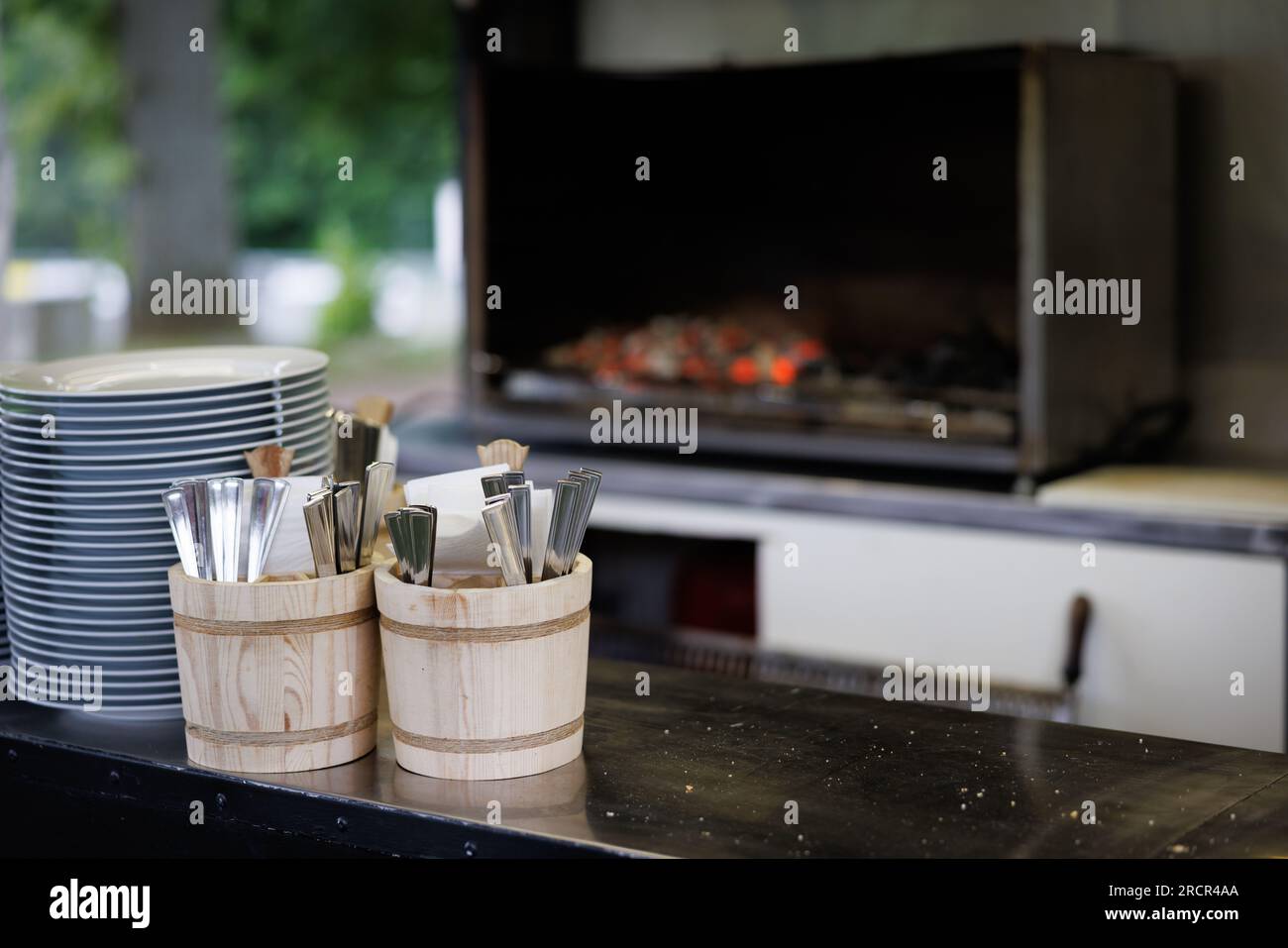 on the counter are containers with cutlery Stock Photo - Alamy