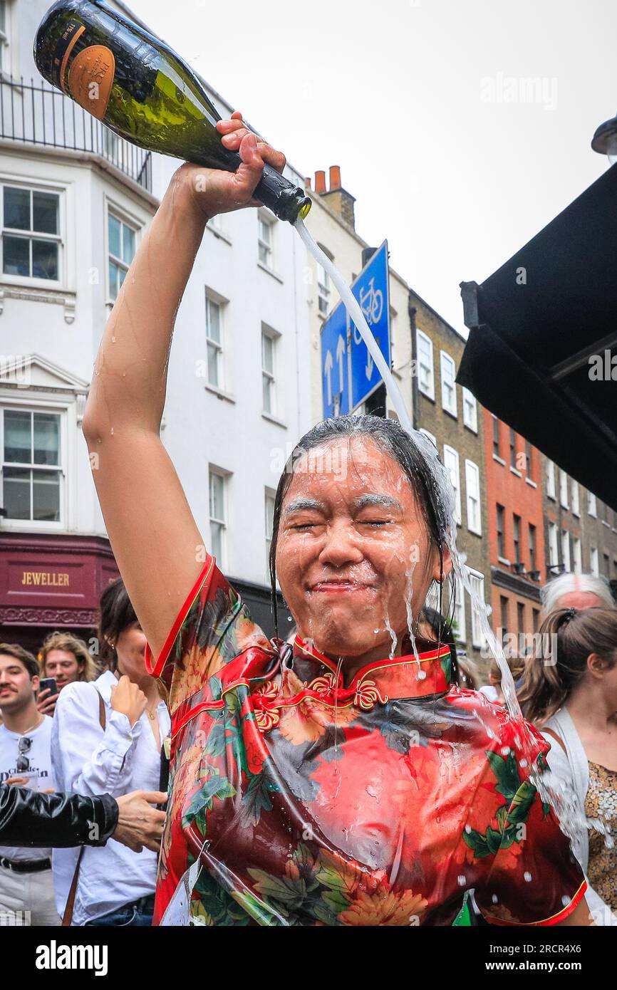 London, UK. 16th July, 2023. A waitress from Coco celebrates. The ...