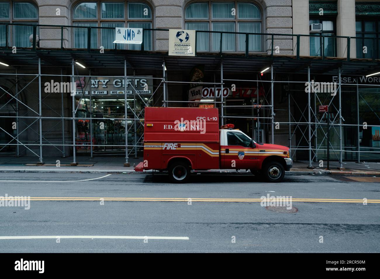 Fire truck standing in front of a building in new york city Stock Photo ...