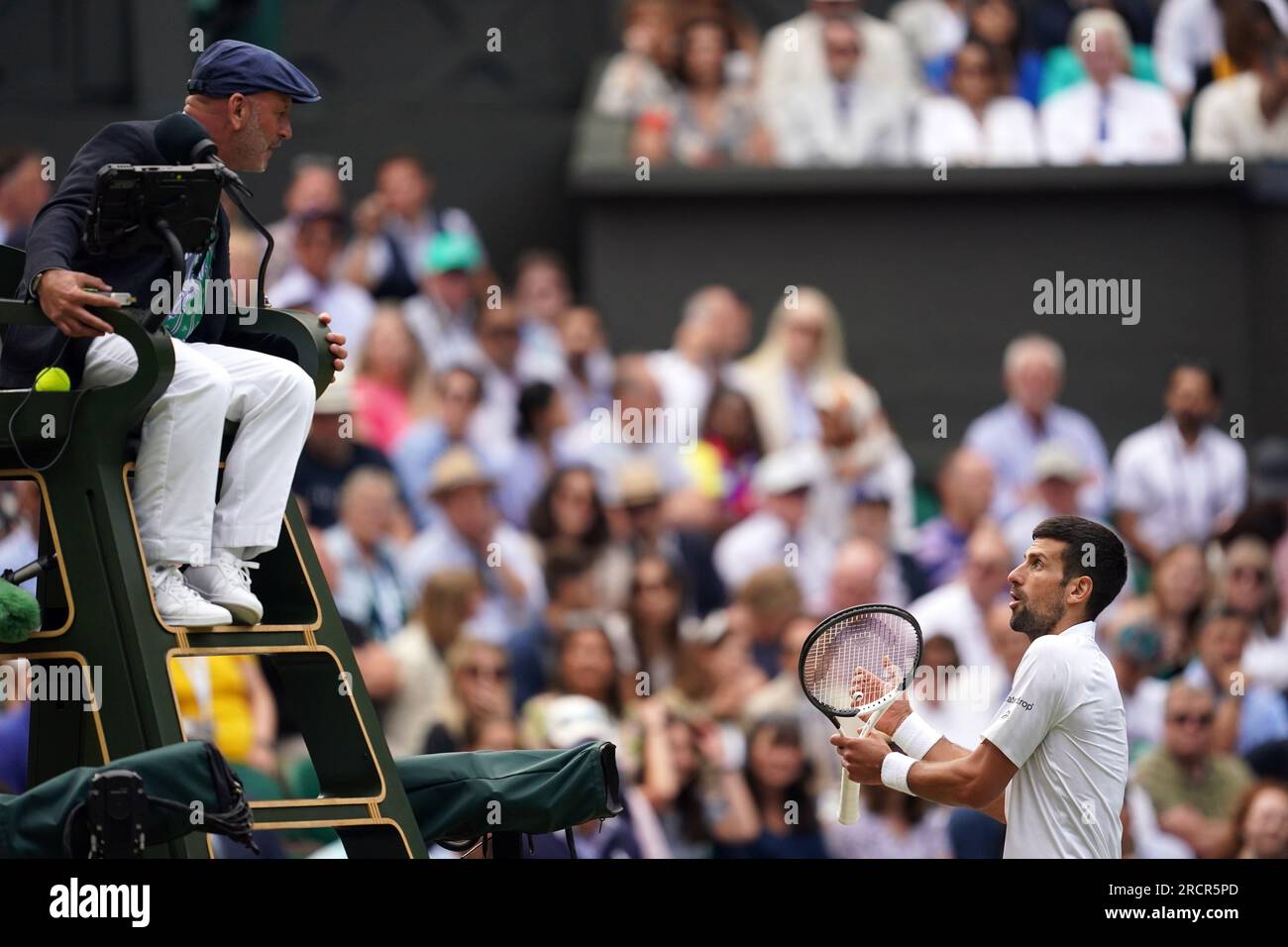 Chair Umpire, Fergus Murphy speaking with Novak Djokovic during the ...
