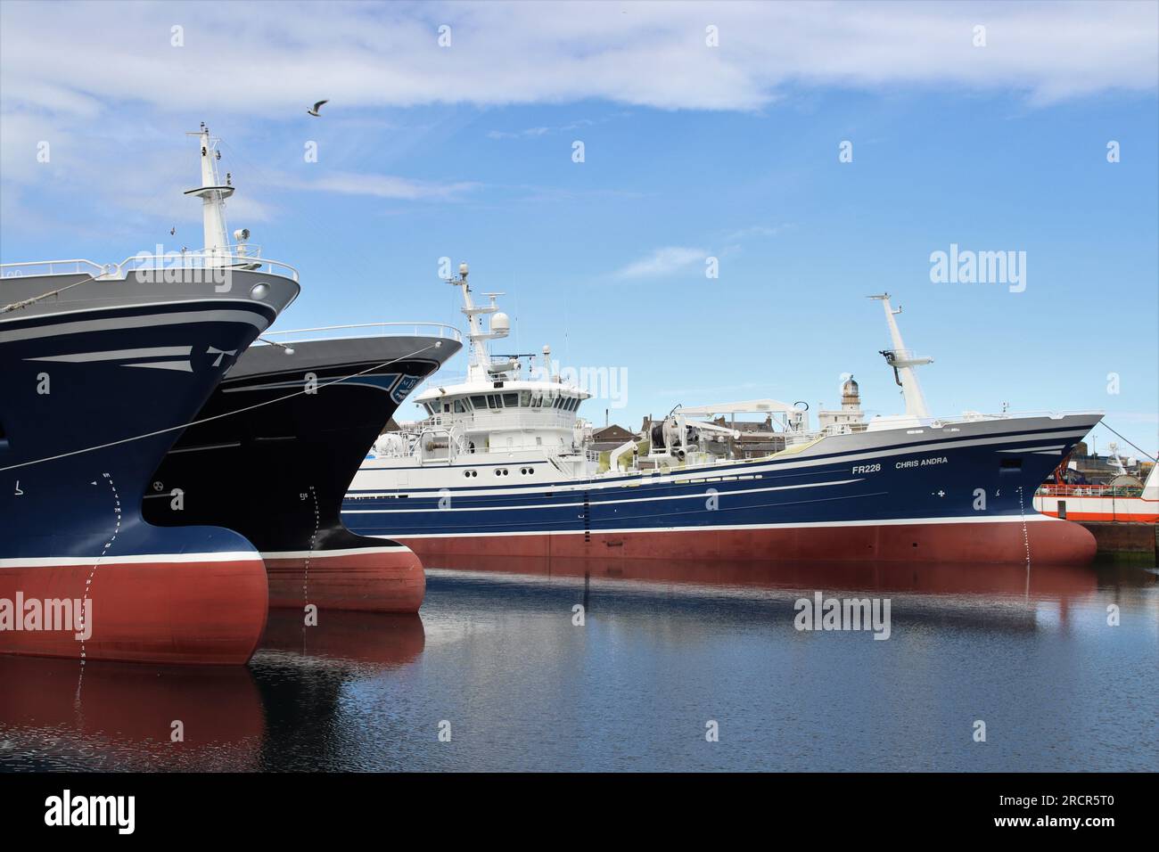 Lifeboat statue and shed, Fraserburgh harbour Stock Photo - Alamy