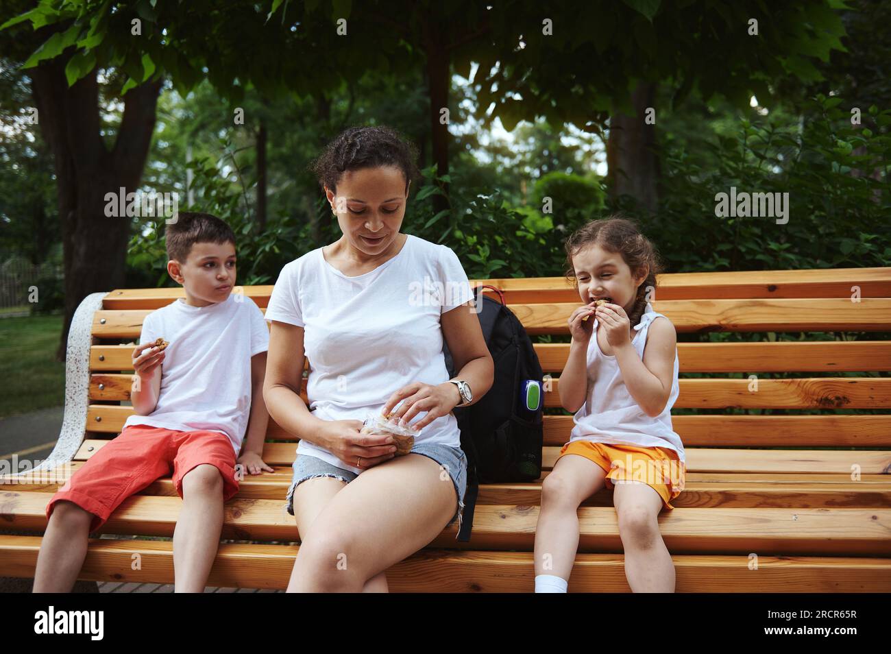 Lifestyle authentic portrait of a multi-ethnic young mother and her ...
