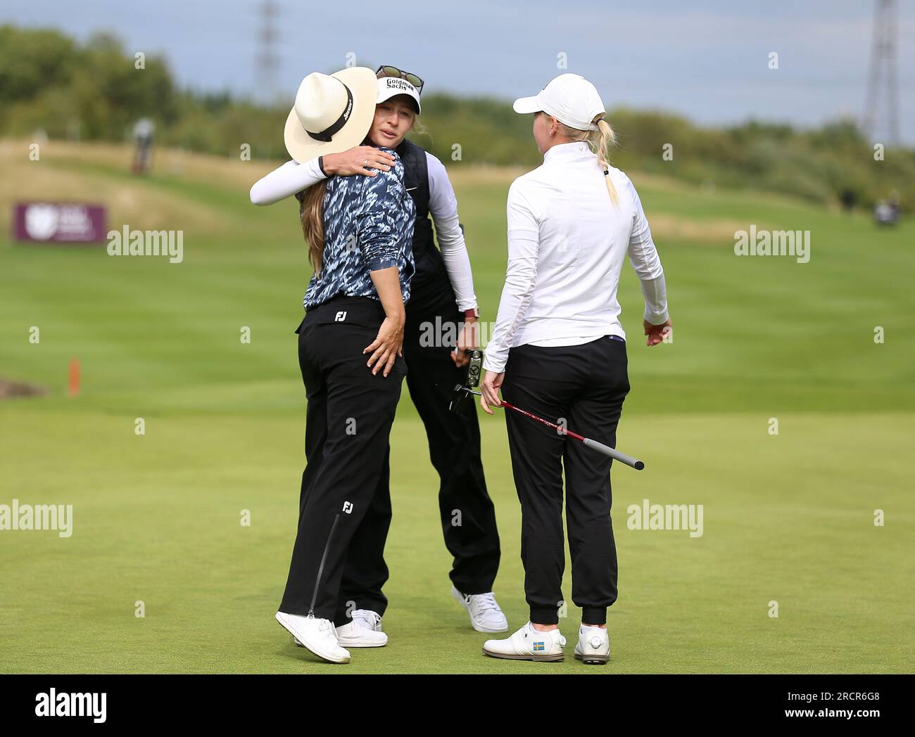 Nelly Korda (centre) celebrates the winning putt with Nicole Garcia and ...