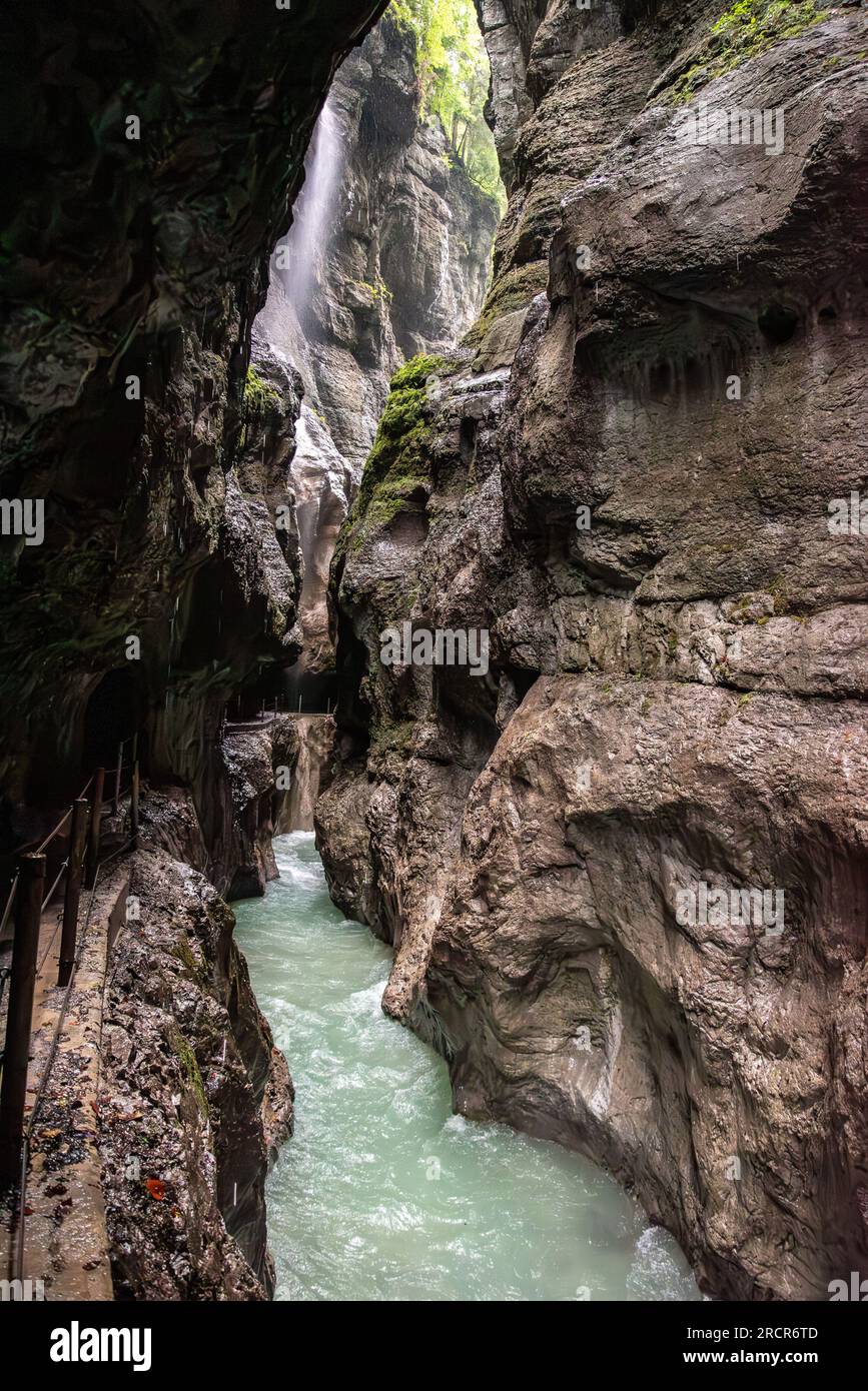 Hiking through the scenic Partnach gorge near Garmisch-Partenkirchen in ...