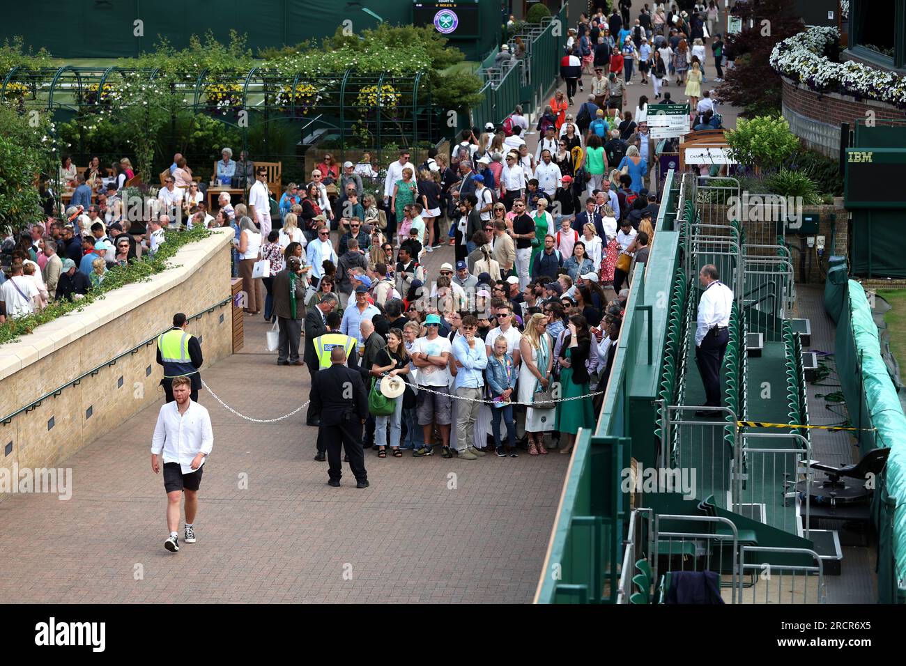 Spectators wait to go onto the hill on day fourteen of the 2023 ...