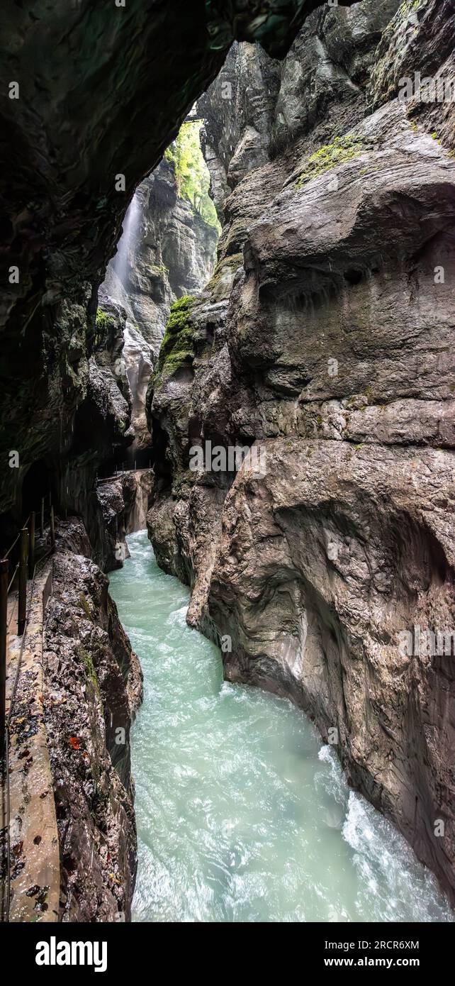 Hiking through the scenic Partnach gorge near Garmisch-Partenkirchen in ...