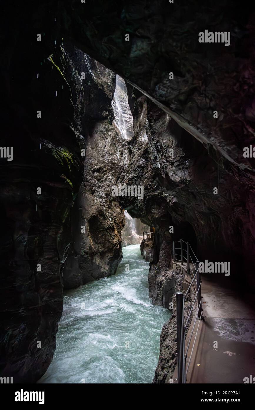 Hiking through the scenic Partnach gorge near Garmisch-Partenkirchen in ...