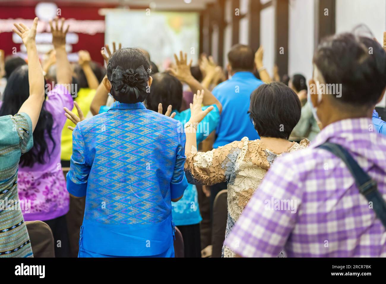 Back view of senior women hands raised to workout and exercise rhythmic ...