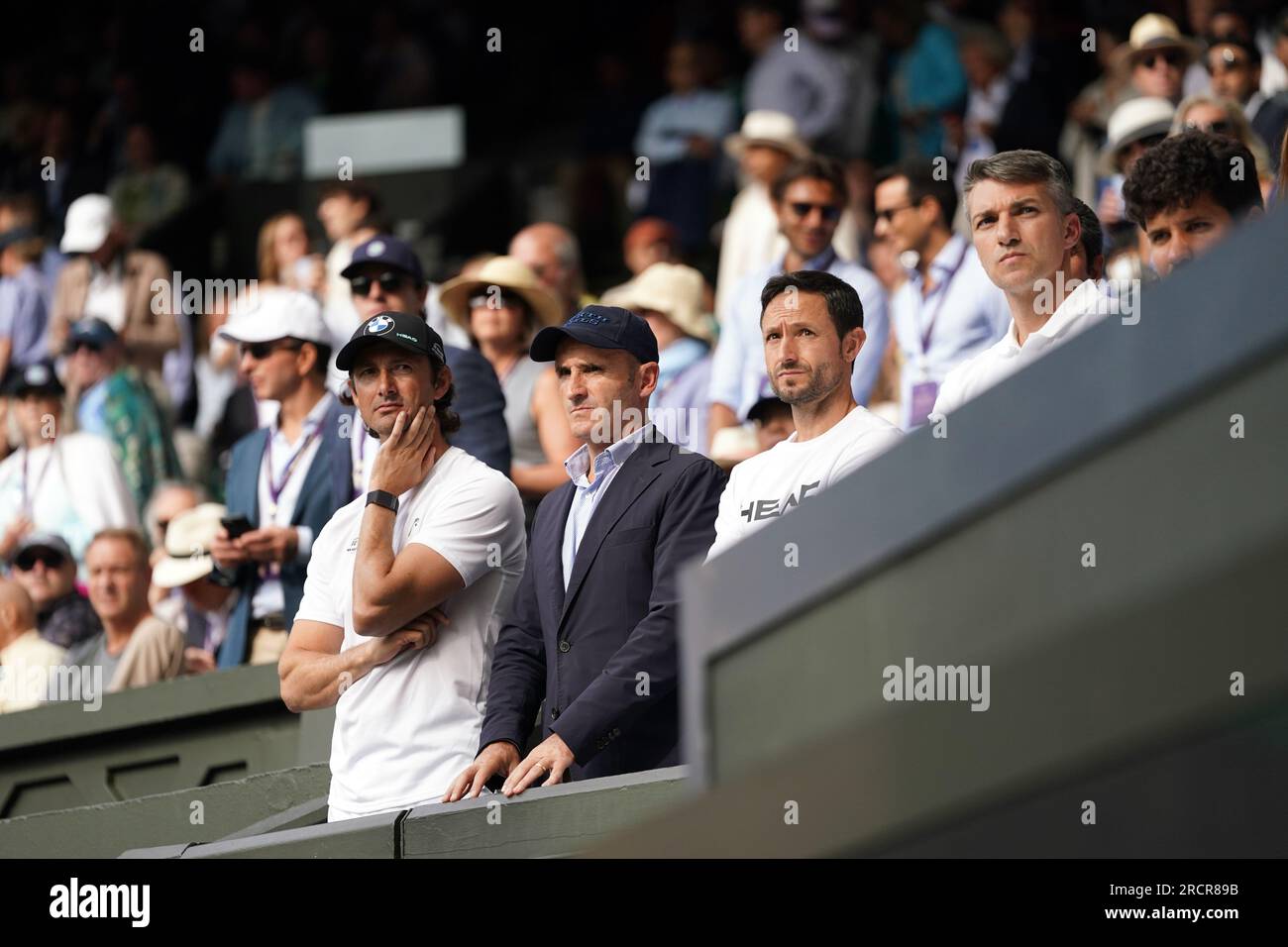 Juan Carlos Ferrero (left), coach of Carlos Alcaraz and Albert Molina (agent), look on during ...
