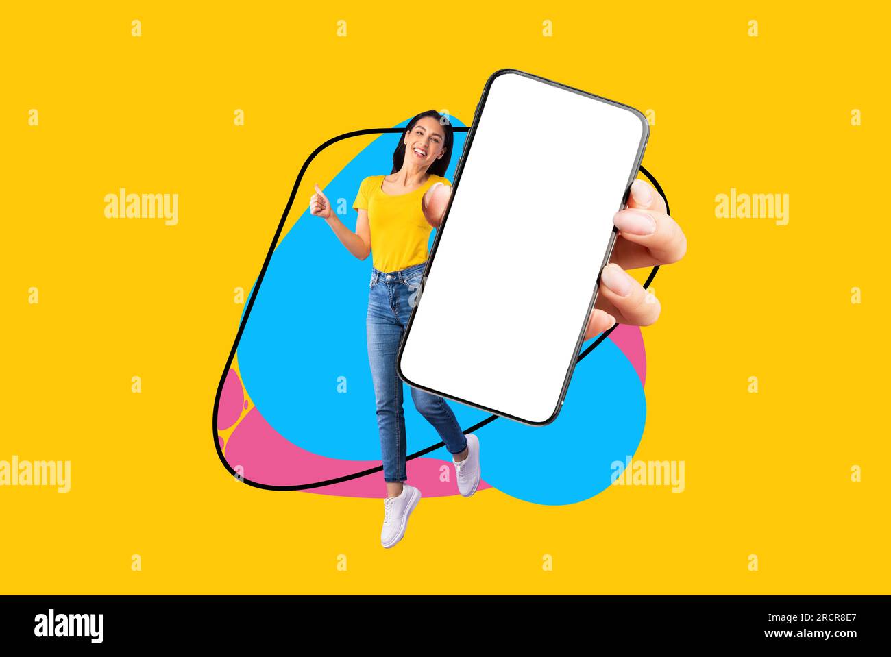 Happy Young Woman Jumping With Big Blank Smartphone In Hand Stock Photo ...
