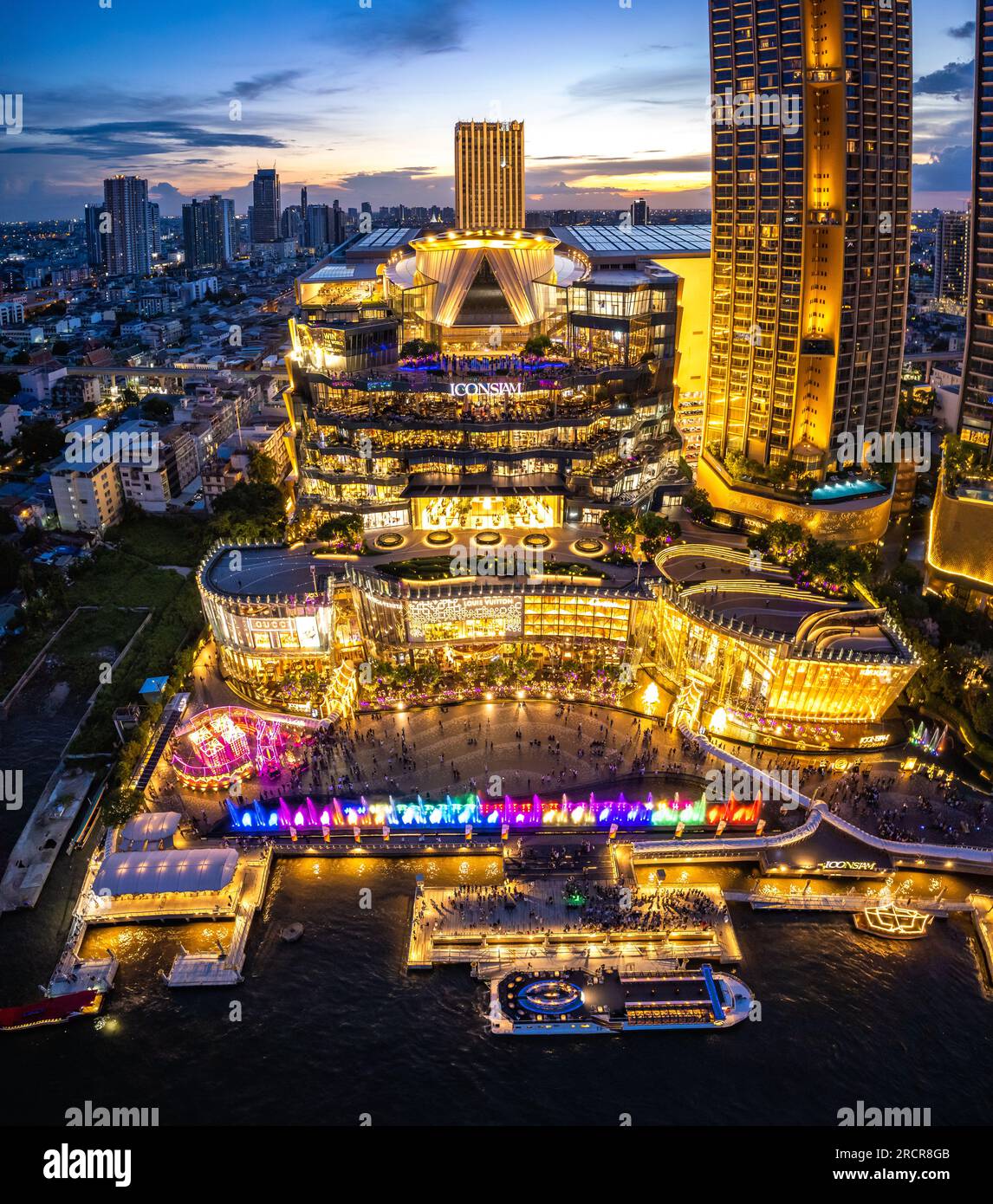 Aerial view of Icon Siam mall by night on the chao phraya river in ...
